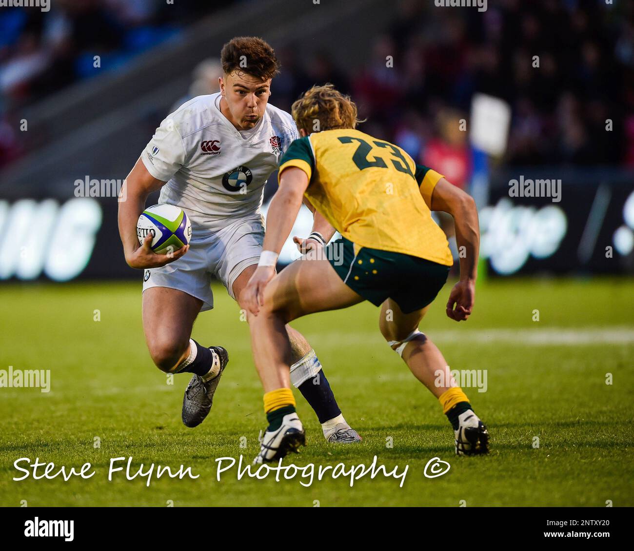 England centre Johnny Williams runs at Australia's Jordan Jackson-Hope ...