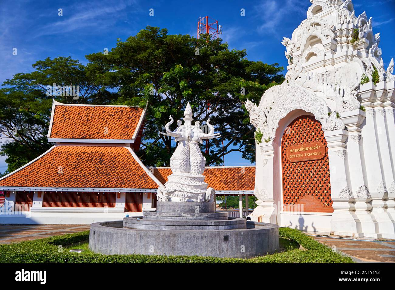 elegant white building in the traditional Thai style.he photo's ...