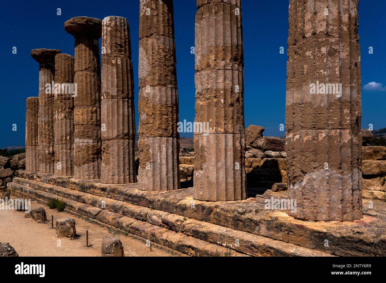 Repairs in brick and render amid remnants of Ancient Greek plaster and ...