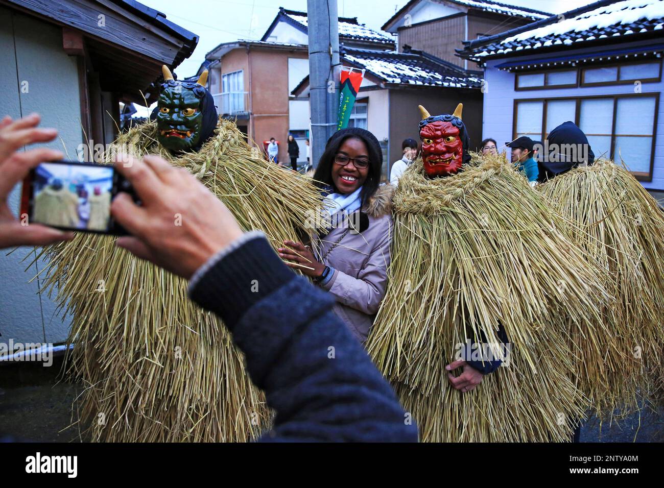 Local residents take part in Amahage ritual event in Yuza Town ...