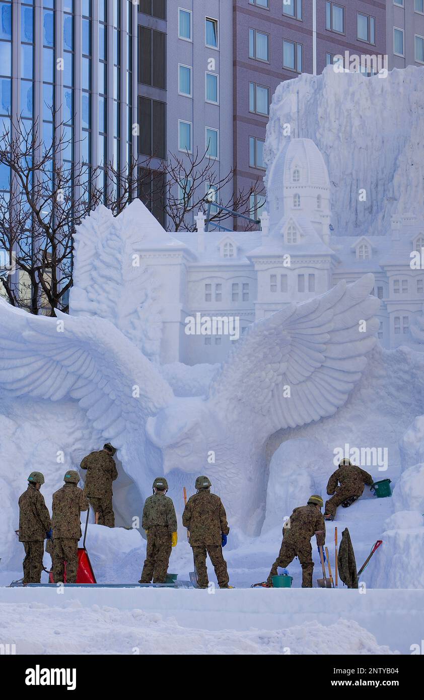 Army collaborating in the preparation of the Sapporo snow festival,snow ...