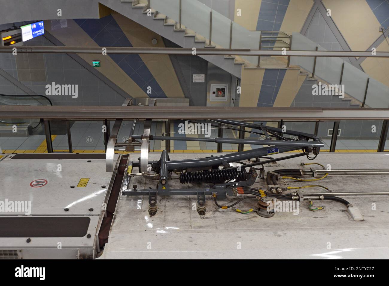 Pantograph on a Siemens Inspiro train in contact with the solid rail ...