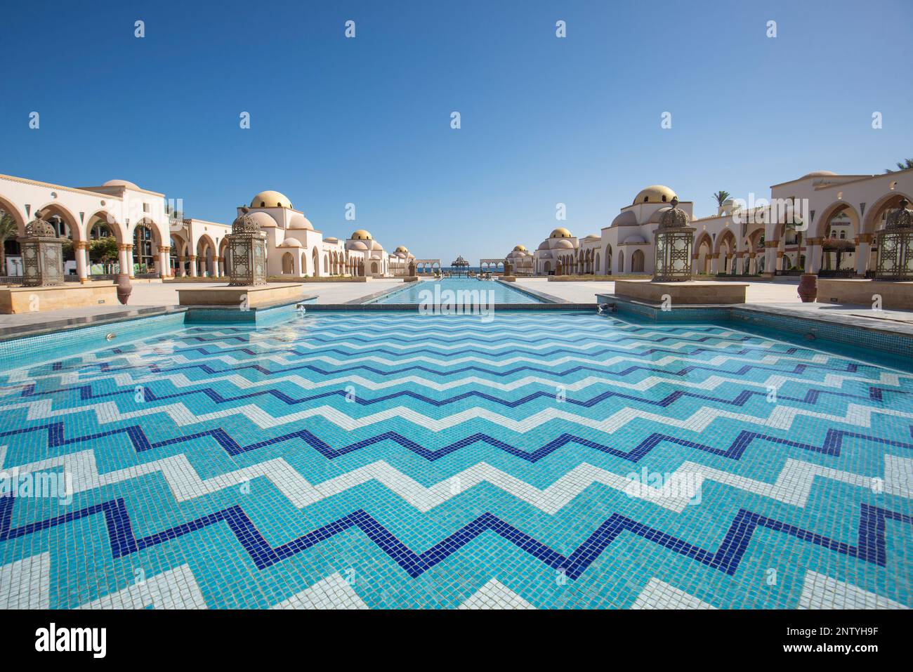Large water feature river in a tropical resort piazza courtyard with ...