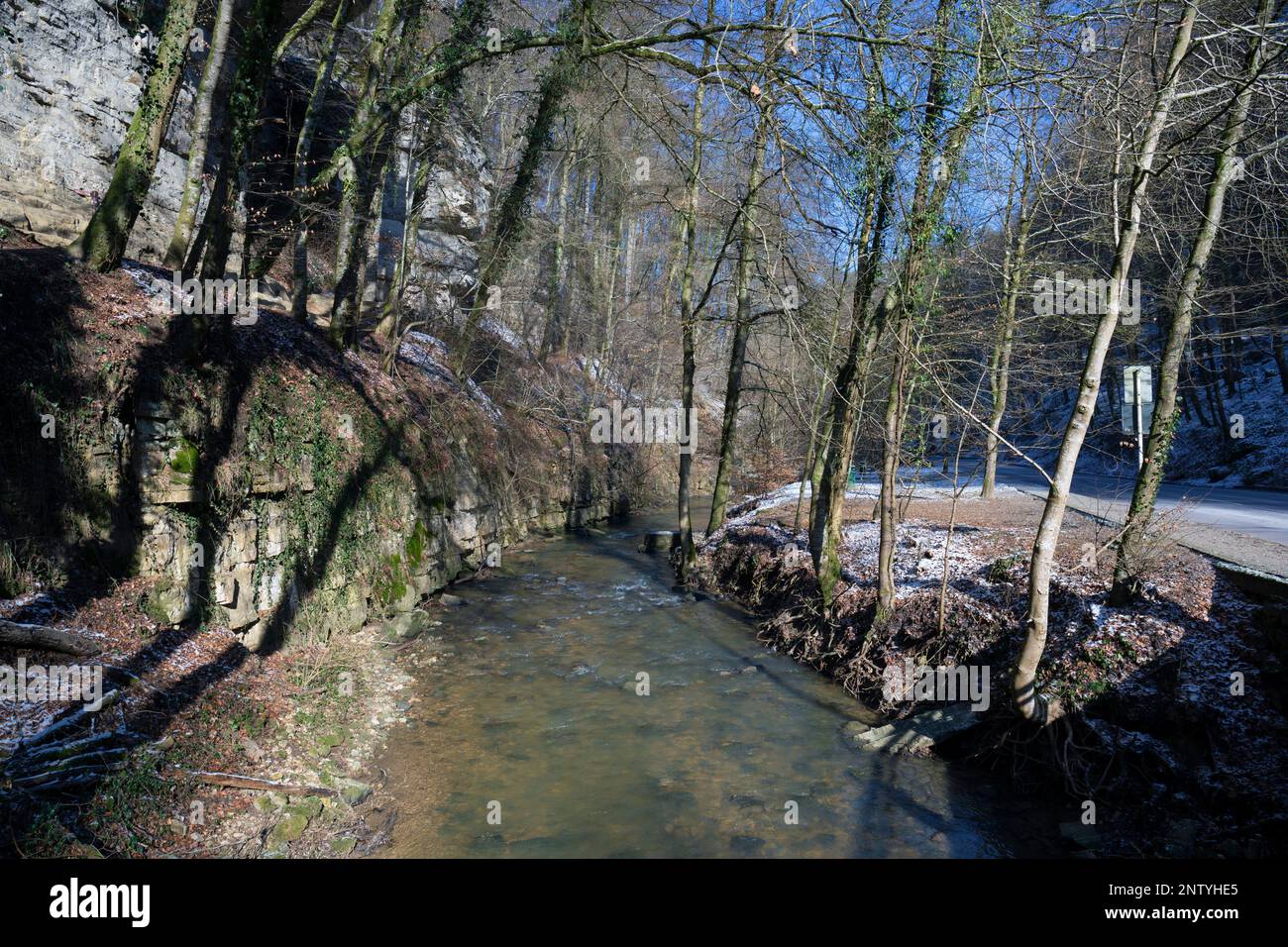Europe, Luxembourg, Mullerthal, Crossing the Black Ernz River near the ...