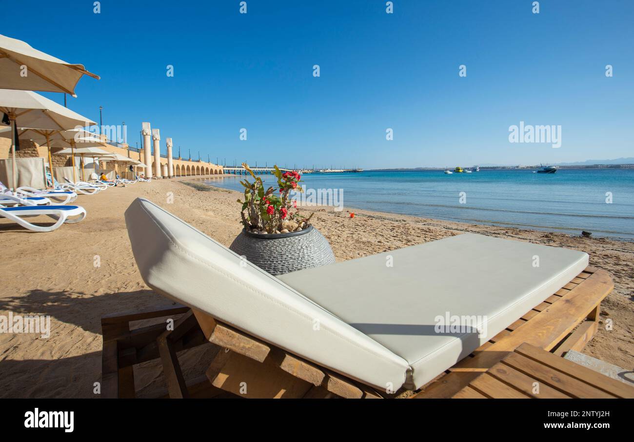 Landscape view over ocean from tropical hotel resort beach with sun ...
