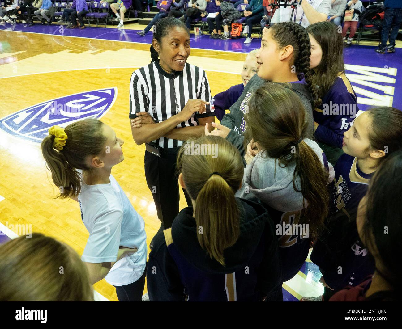 SEATTLE, WA - FEBRUARY 07: Young fans communicating with an official ...