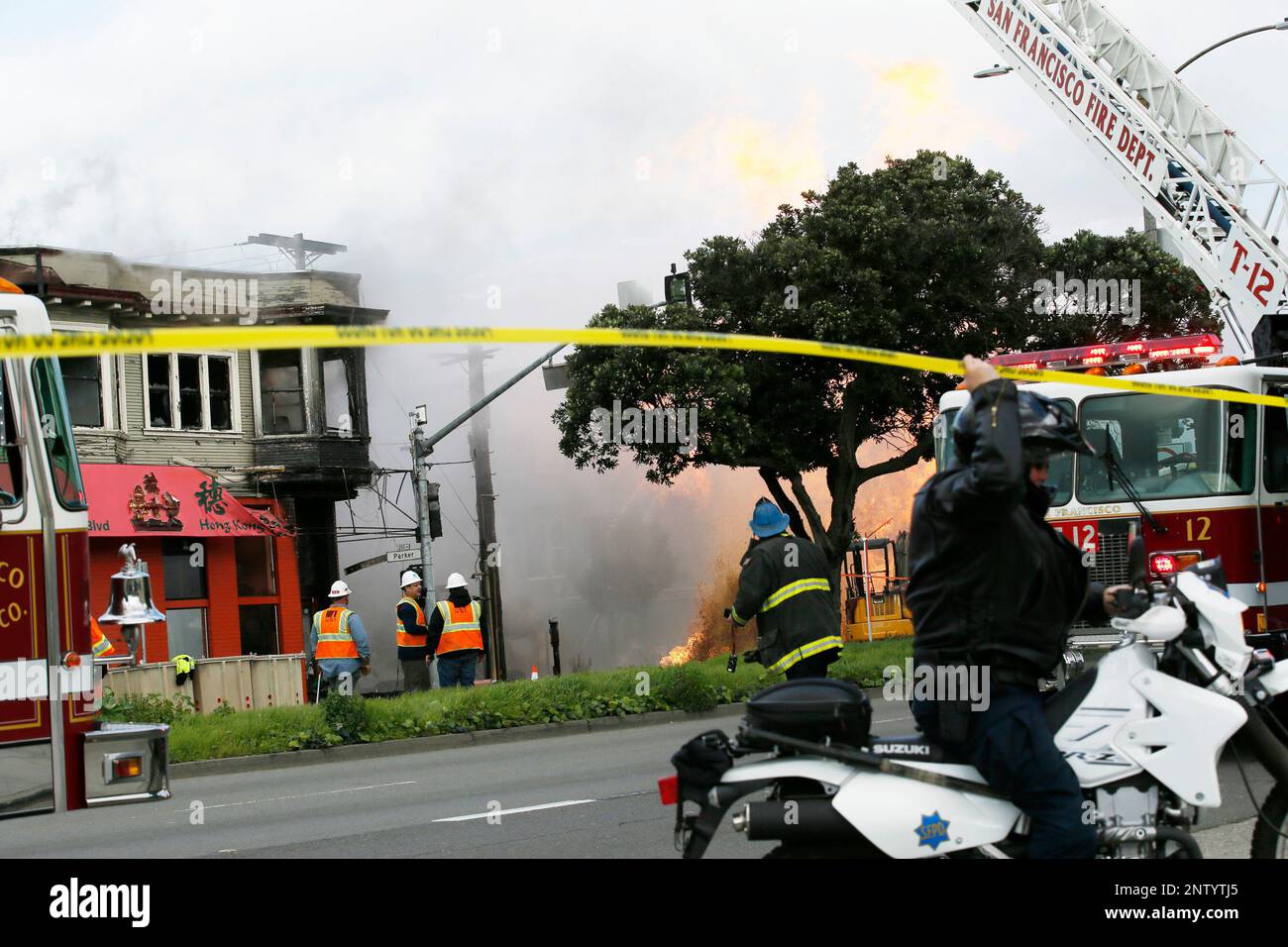 CORRECTS SOURCE TO SAN FRANCISCO CHRONICLE- Firefighters battle a fire ...