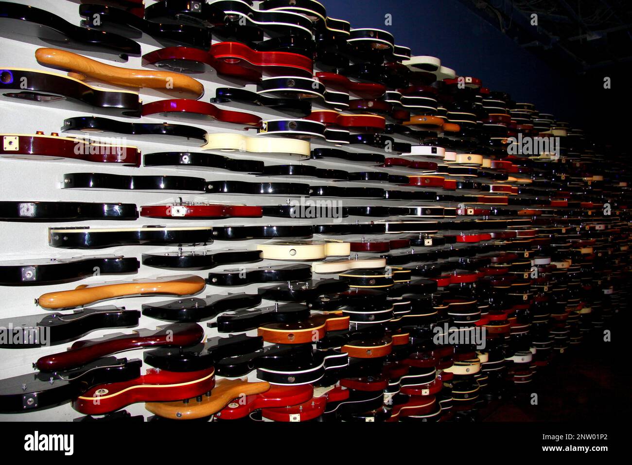 Artistic close-up of a wall full of half guitars at the Hard Rock Cafe ...