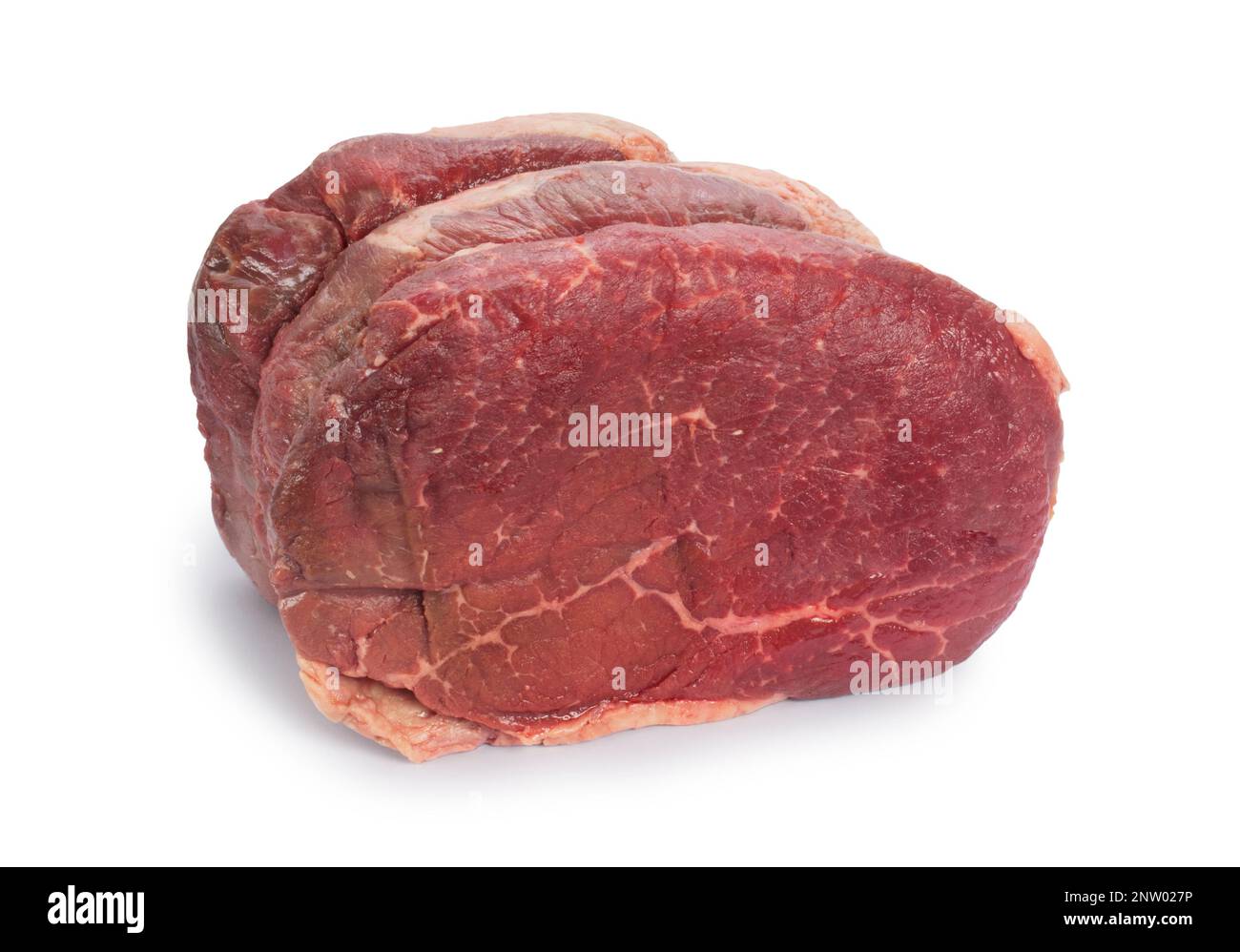 Studio shot of organic topside of beef cut out against a white ...