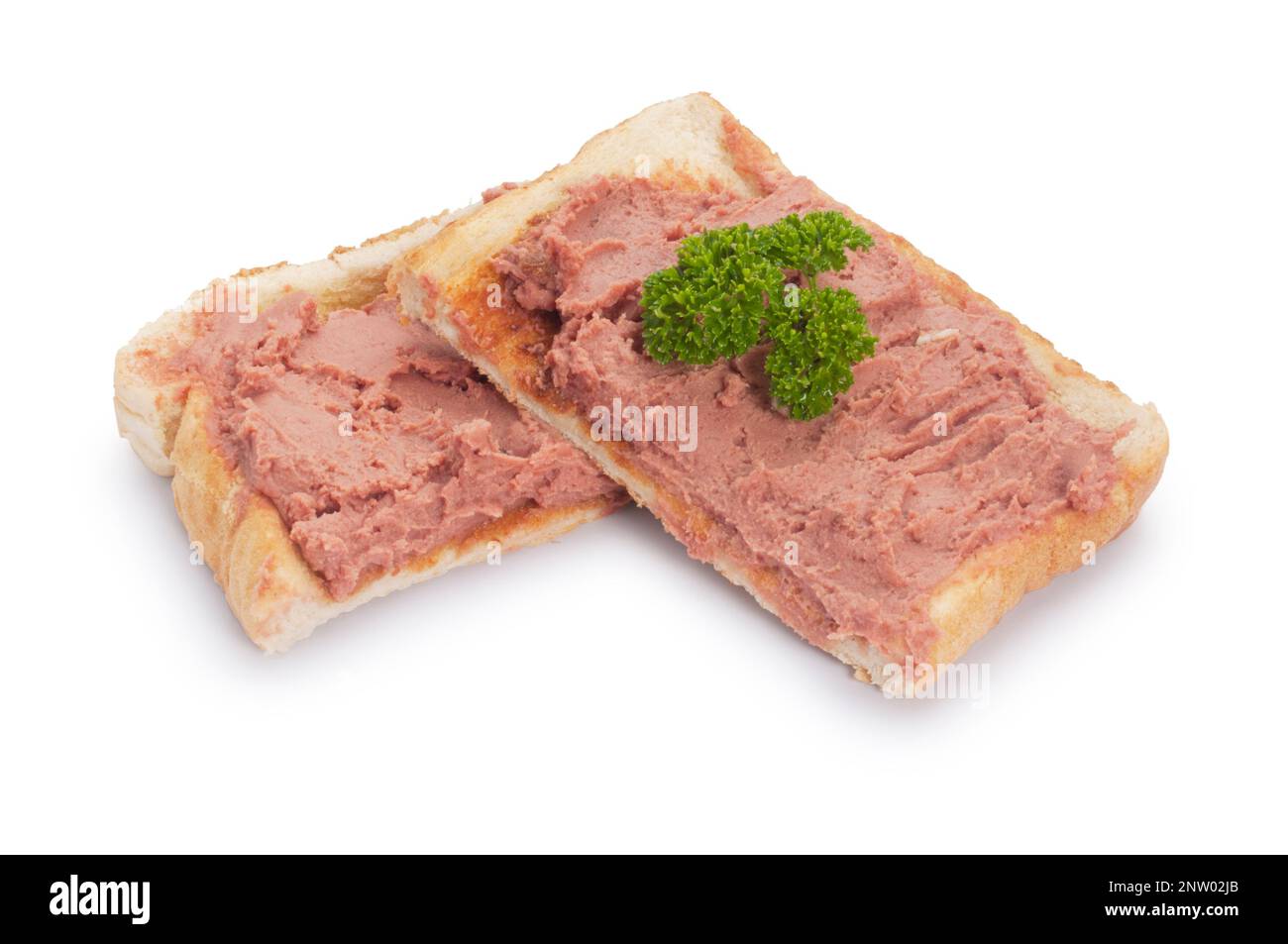 Studio shot of chicken liver pate spread on toast cut out against a ...