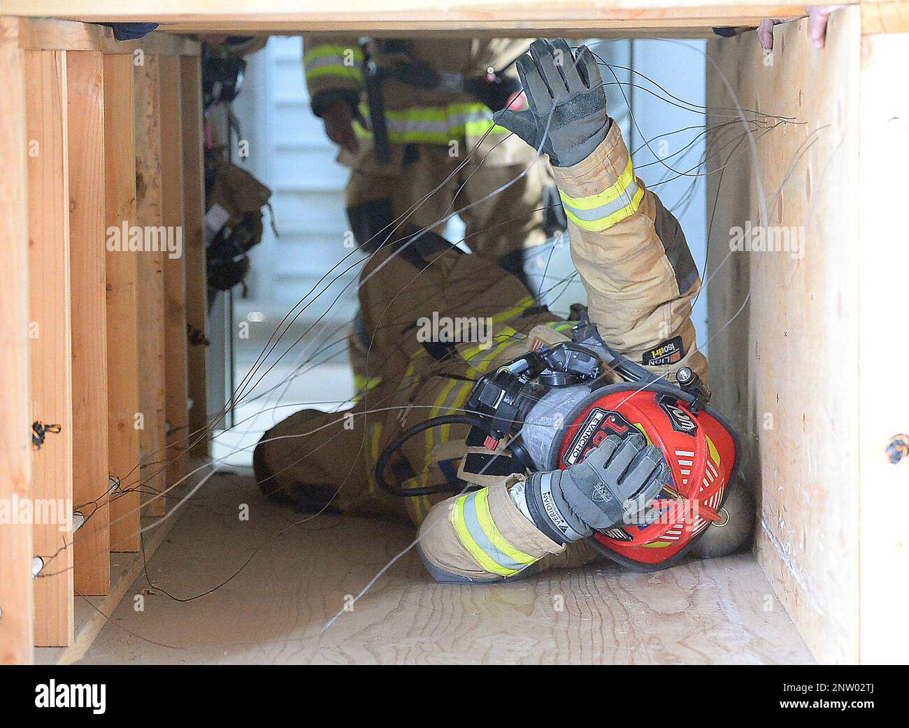 Yuma Fire Department Capt. Paul Evancho navigates a close quarters ...