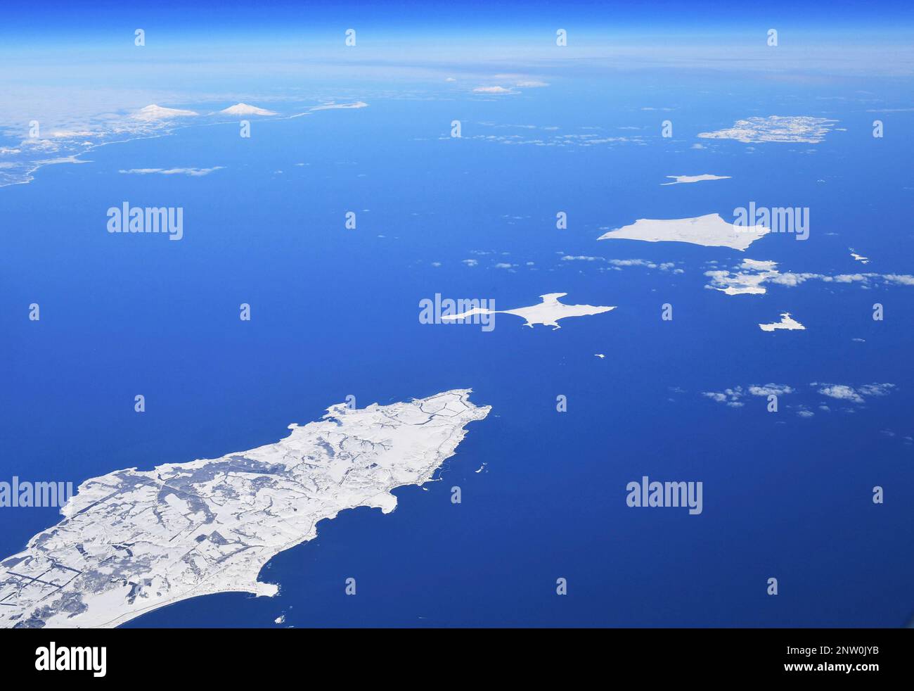 An aerial photo taken from Yomiuri Shimbun's jetliner shows the four ...