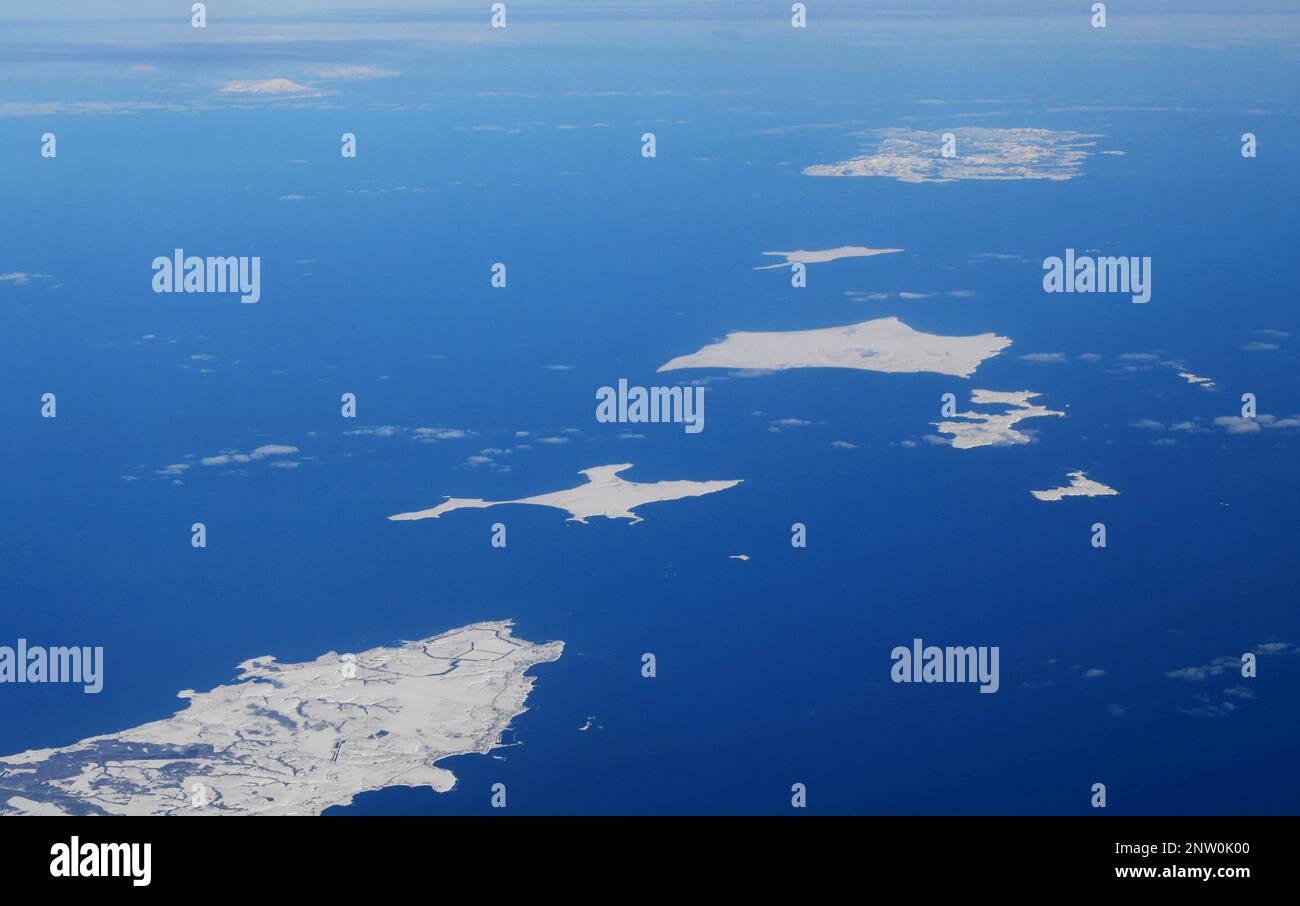 An aerial photo taken from Yomiuri Shimbun's jetliner shows the four ...