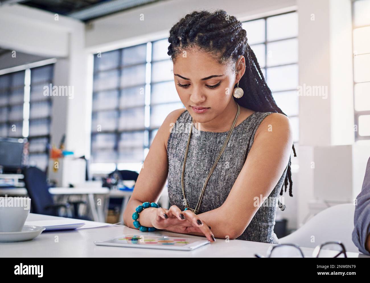 Office tablet, reading and black woman working on data analysis, social ...
