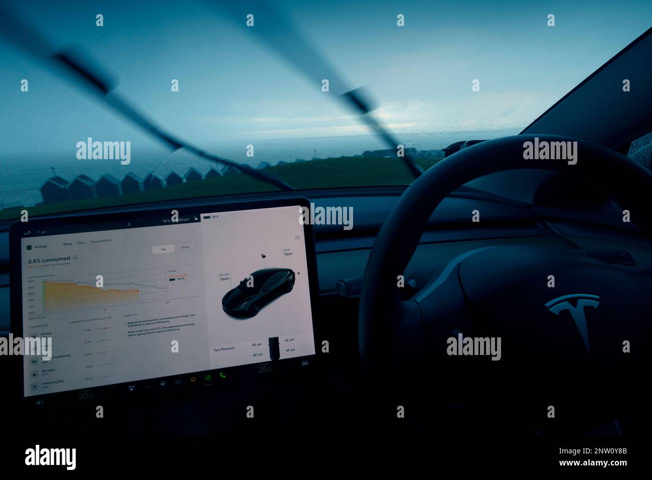 Tesla,M3,LR,Long,range,charging, screen,rain,sea,front,Gurnard, Isle of ...