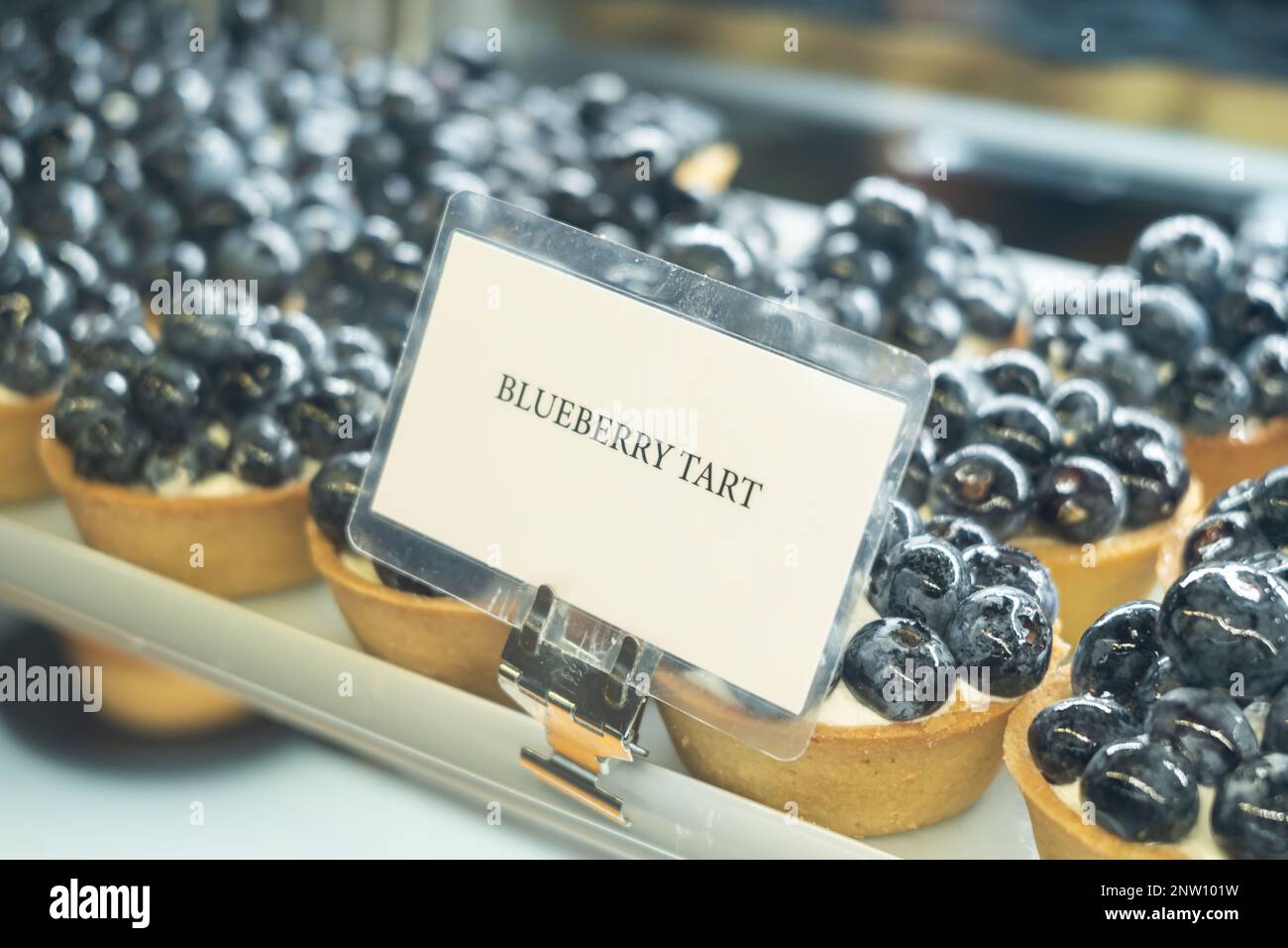 Blueberry tarts selling in the bakery shop Stock Photo - Alamy