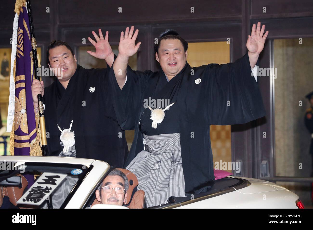 Mongolian sekiwake Tamawashi (R) celebrates after grabbing his first ...