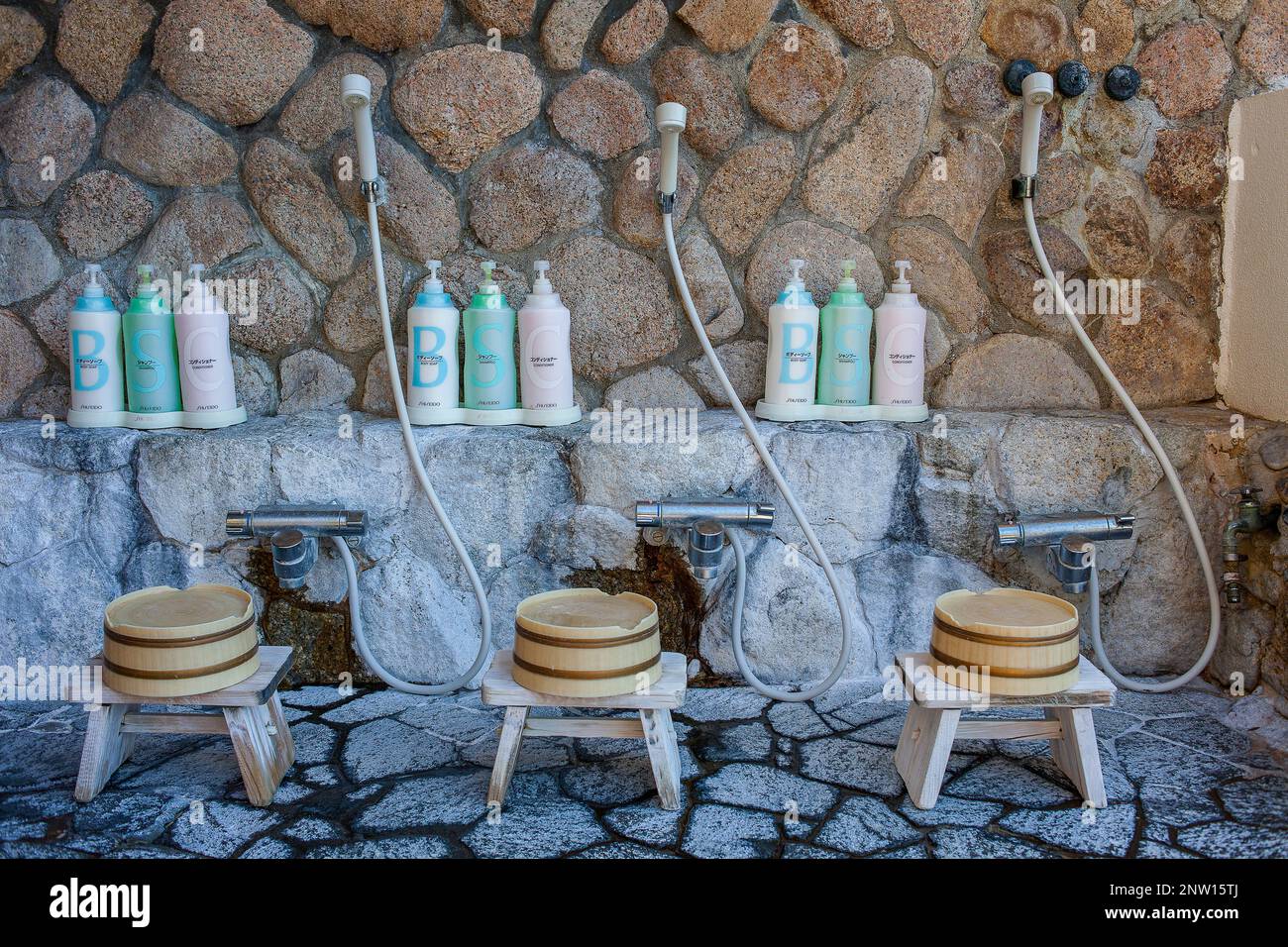 Detail of showers in Chomon-no-yu, outdoor rotemburo or onsen, is the ...