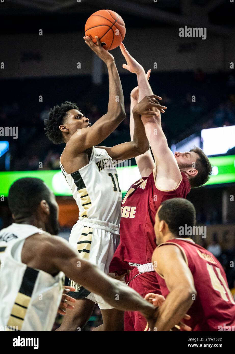 Wake Forest forward Jaylen Hoard (10) shoots over Boston College ...