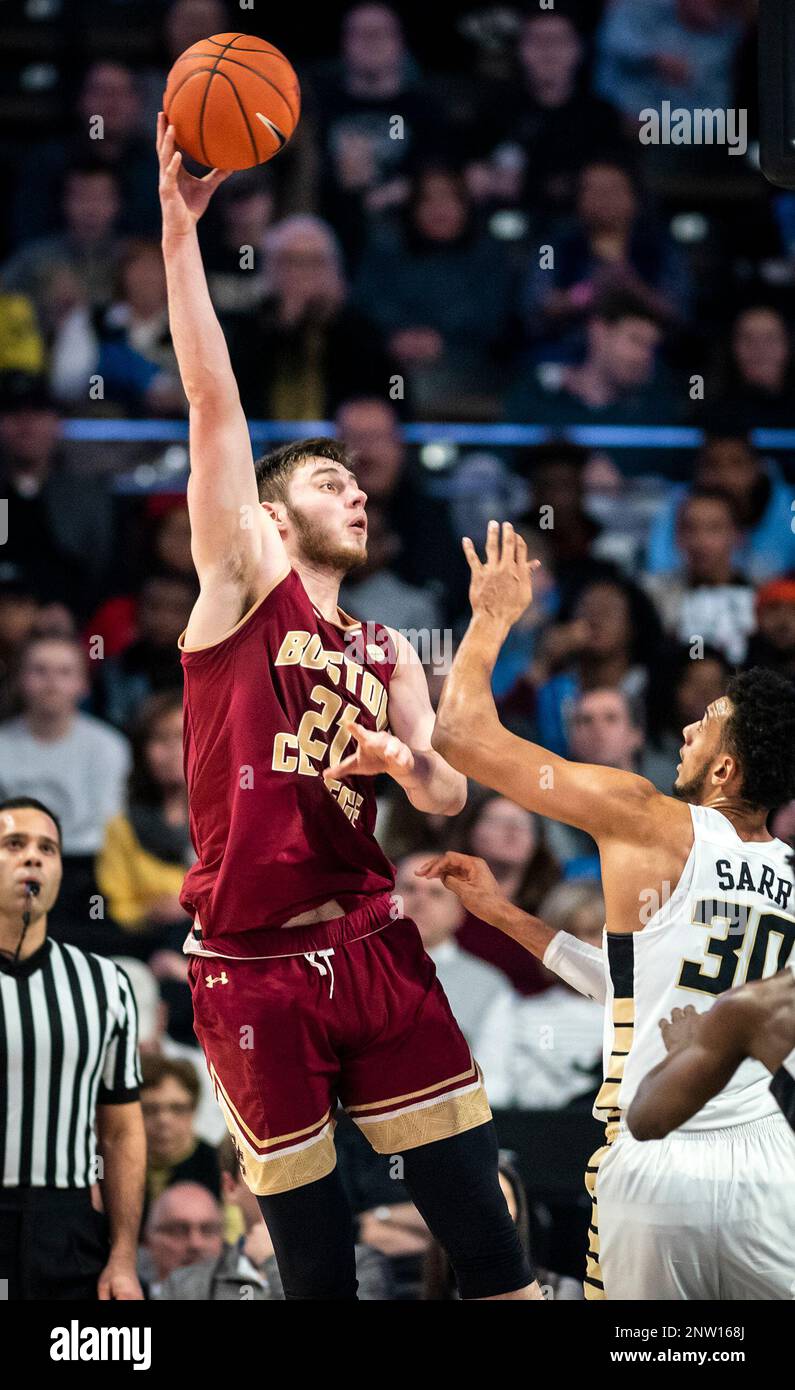 Boston College forward Nik Popovic (21) shoots over Wake Forest center ...