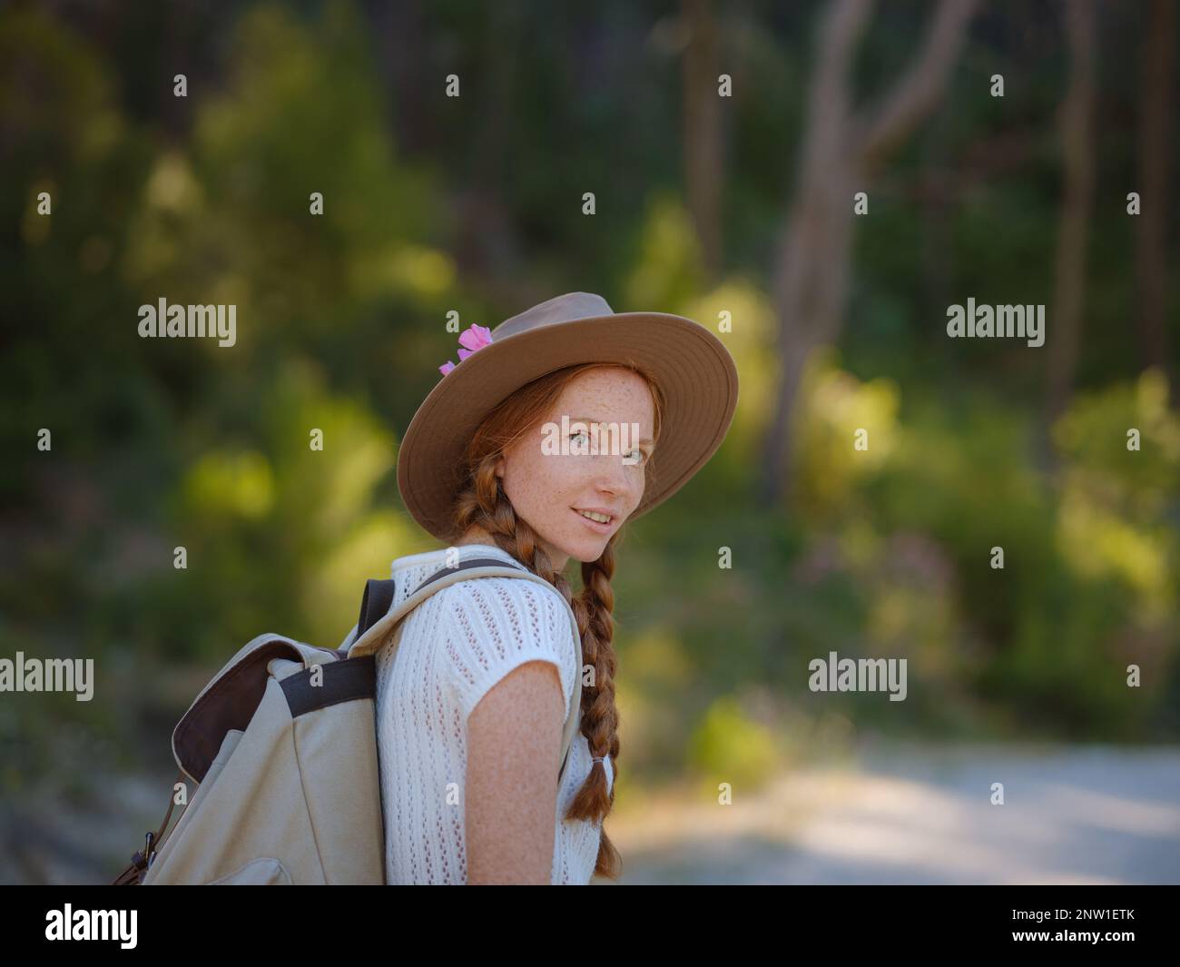 Caucasian ginger young beautiful female backpacker traveling alone in ...