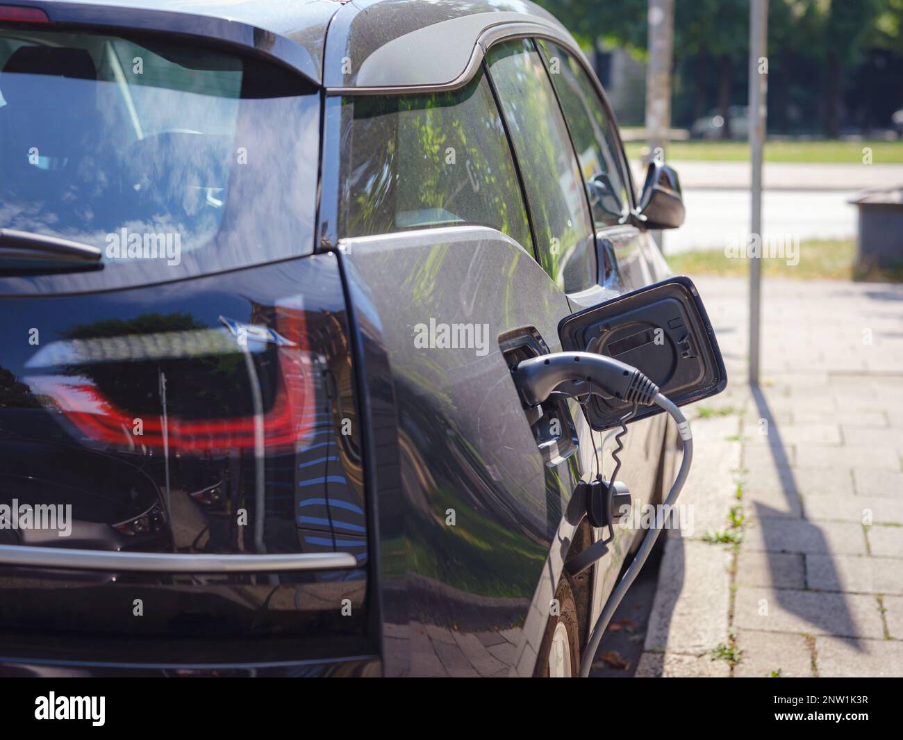 Munich, Germany - August 5, 2022 : Electric car with opened charging ...