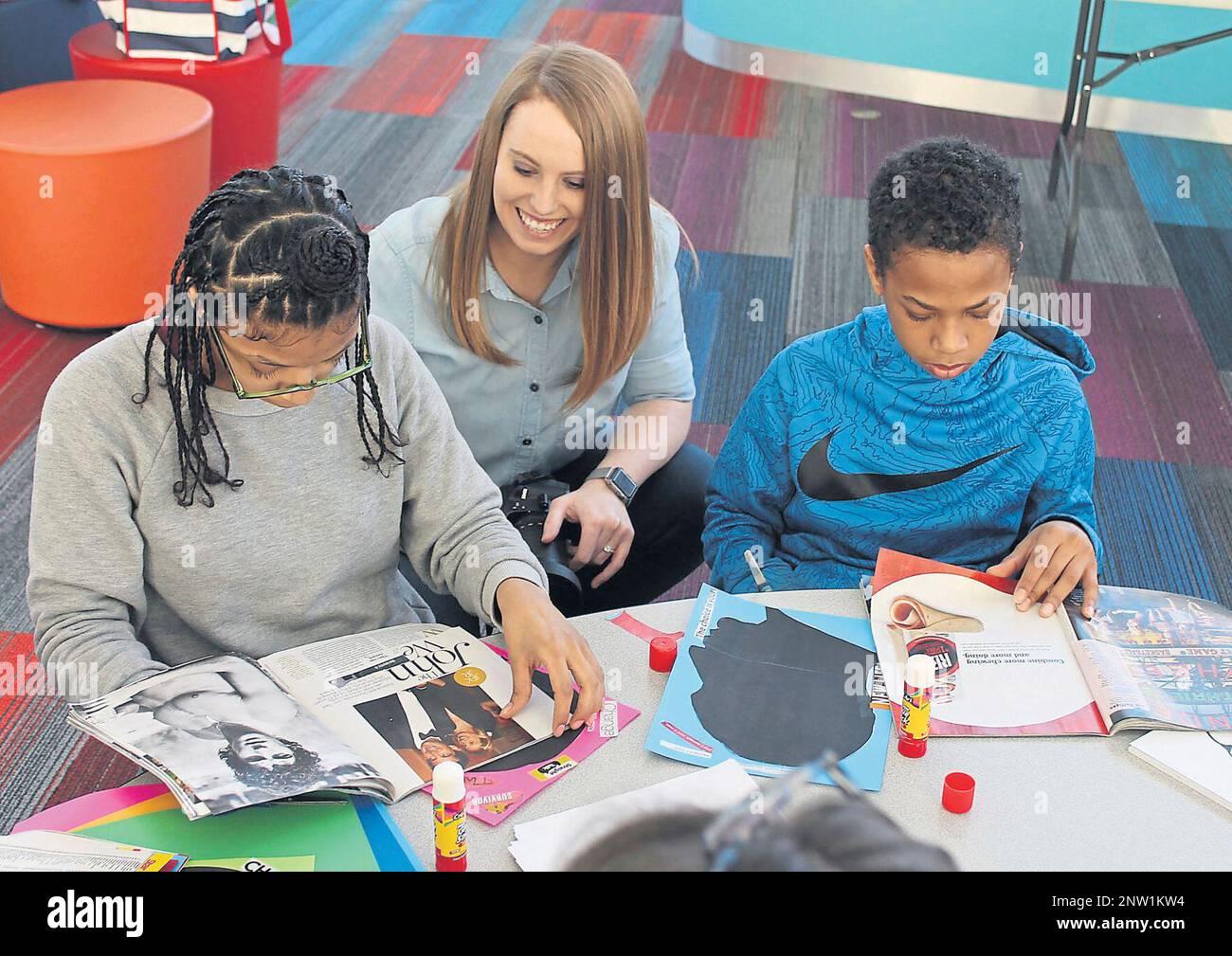 Older children cut out silhouettes of Martin Luther King, then cut ...