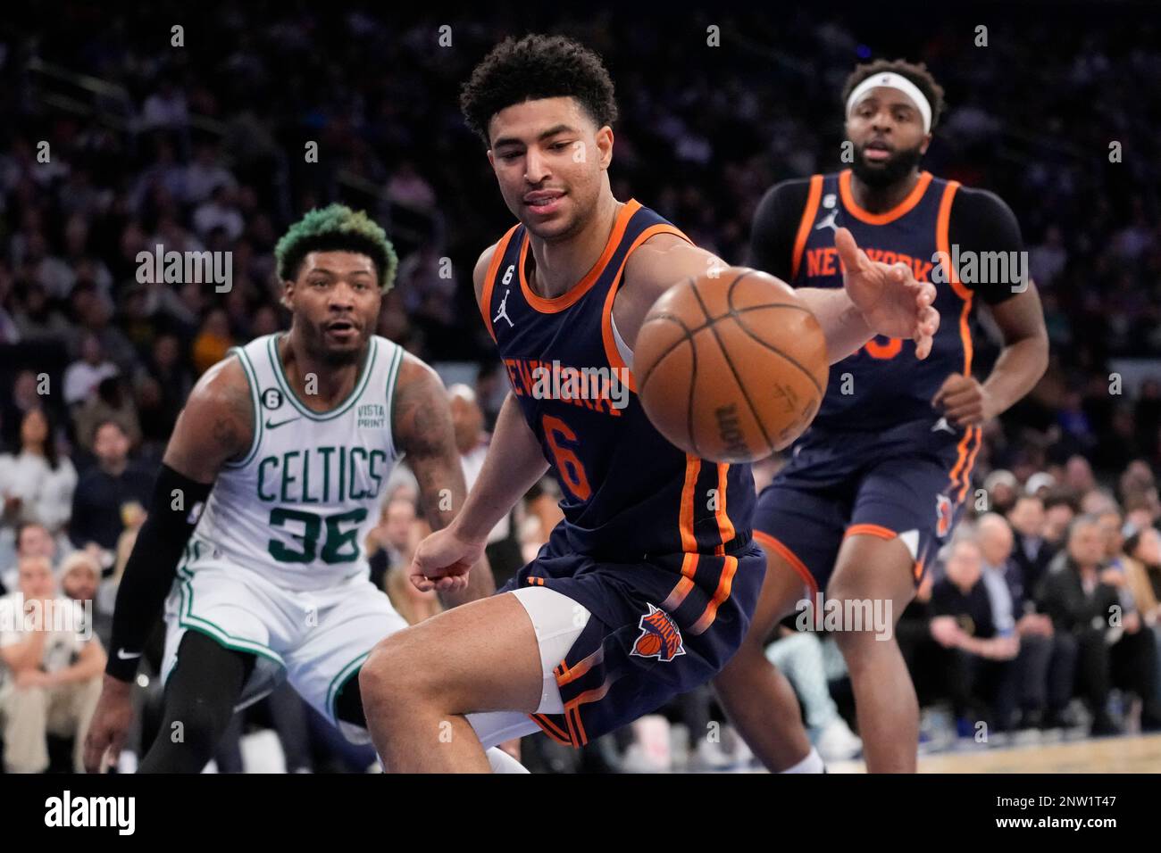 New York Knicks guard Quentin Grimes (6) receives the ball on a drive ...