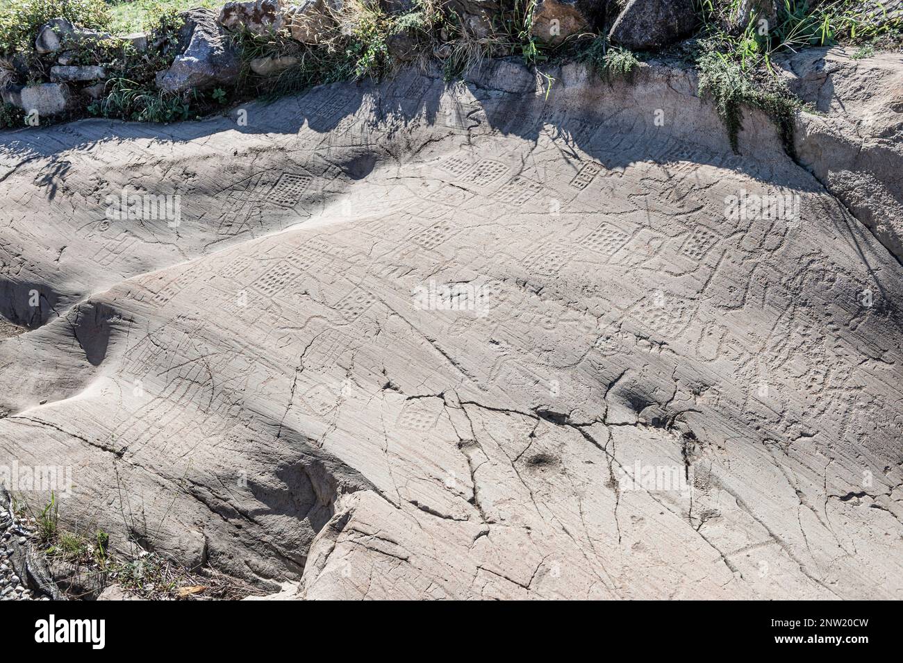 rocks with rocky engravings, map of bedolina, capo di ponte, italy ...