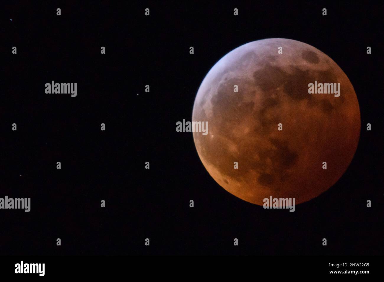 TORONTO, ON - JANUARY 20: The moon seen during a lunar eclipse referred ...