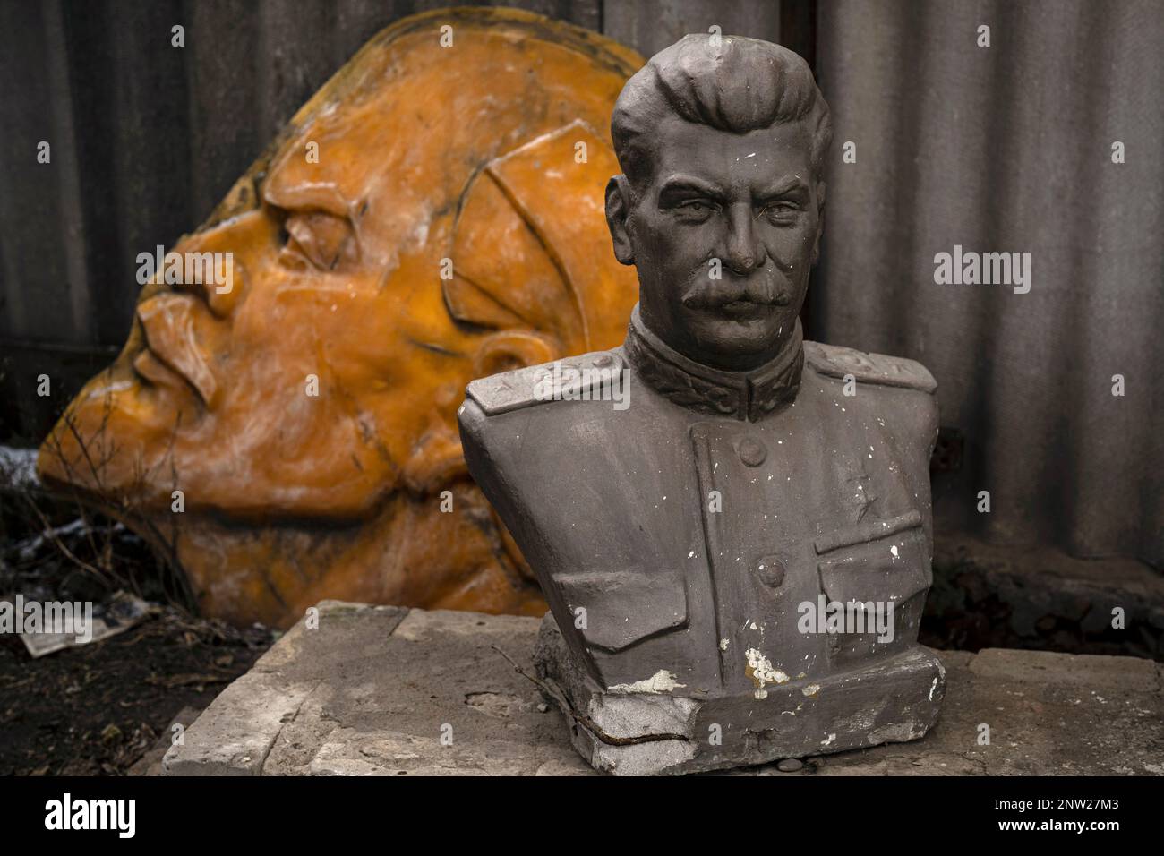 Discarded communist era statues depicting Stalin and Lenin lay on the ...