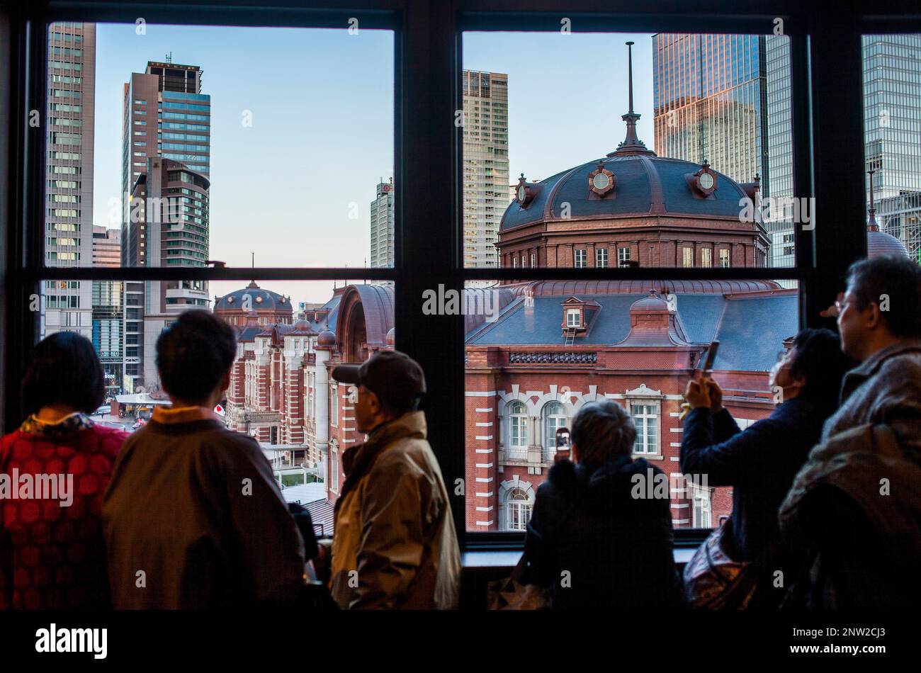 Tokyo Station and skyscrapers of Marunouchi from Kitte building ...