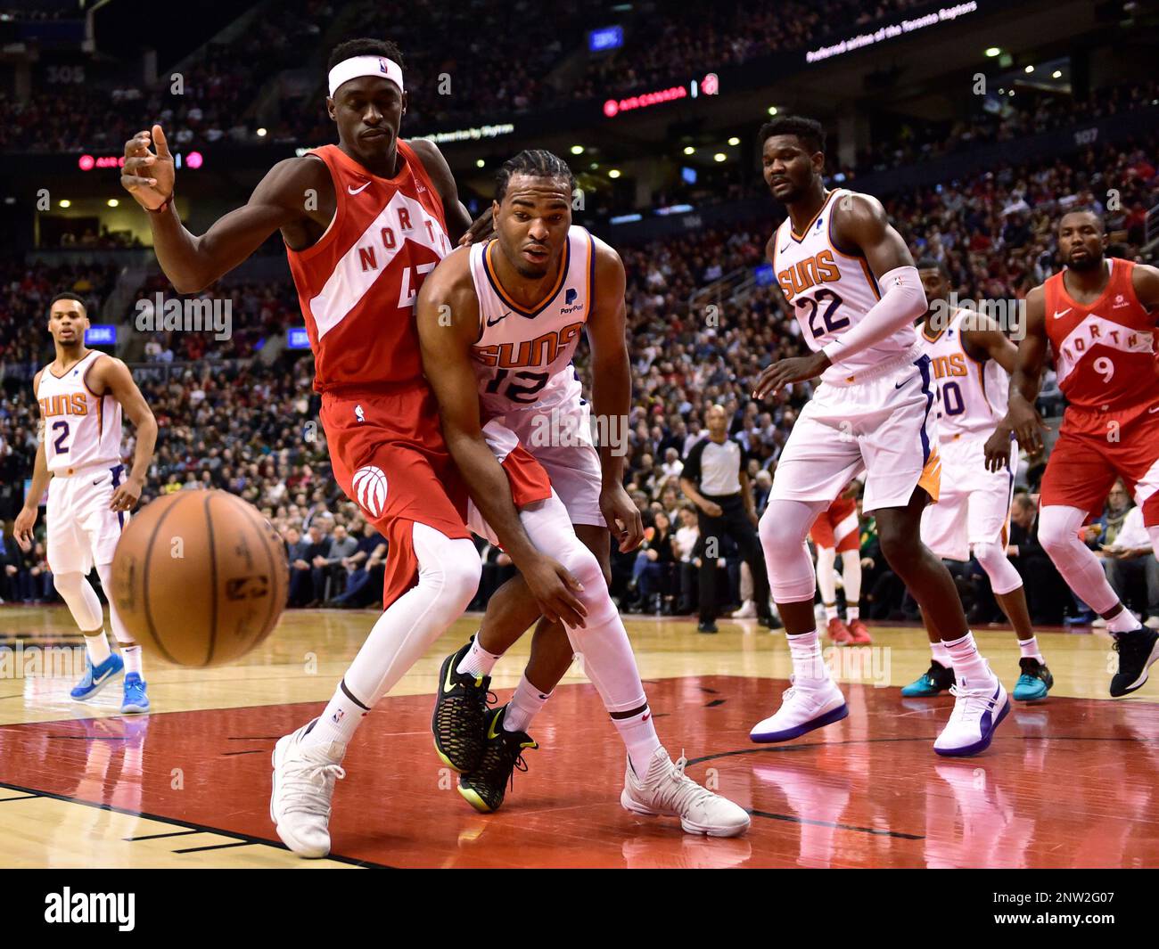 Toronto Raptors forward Pascal Siakam (43) and Phoenix Suns forward T.J ...