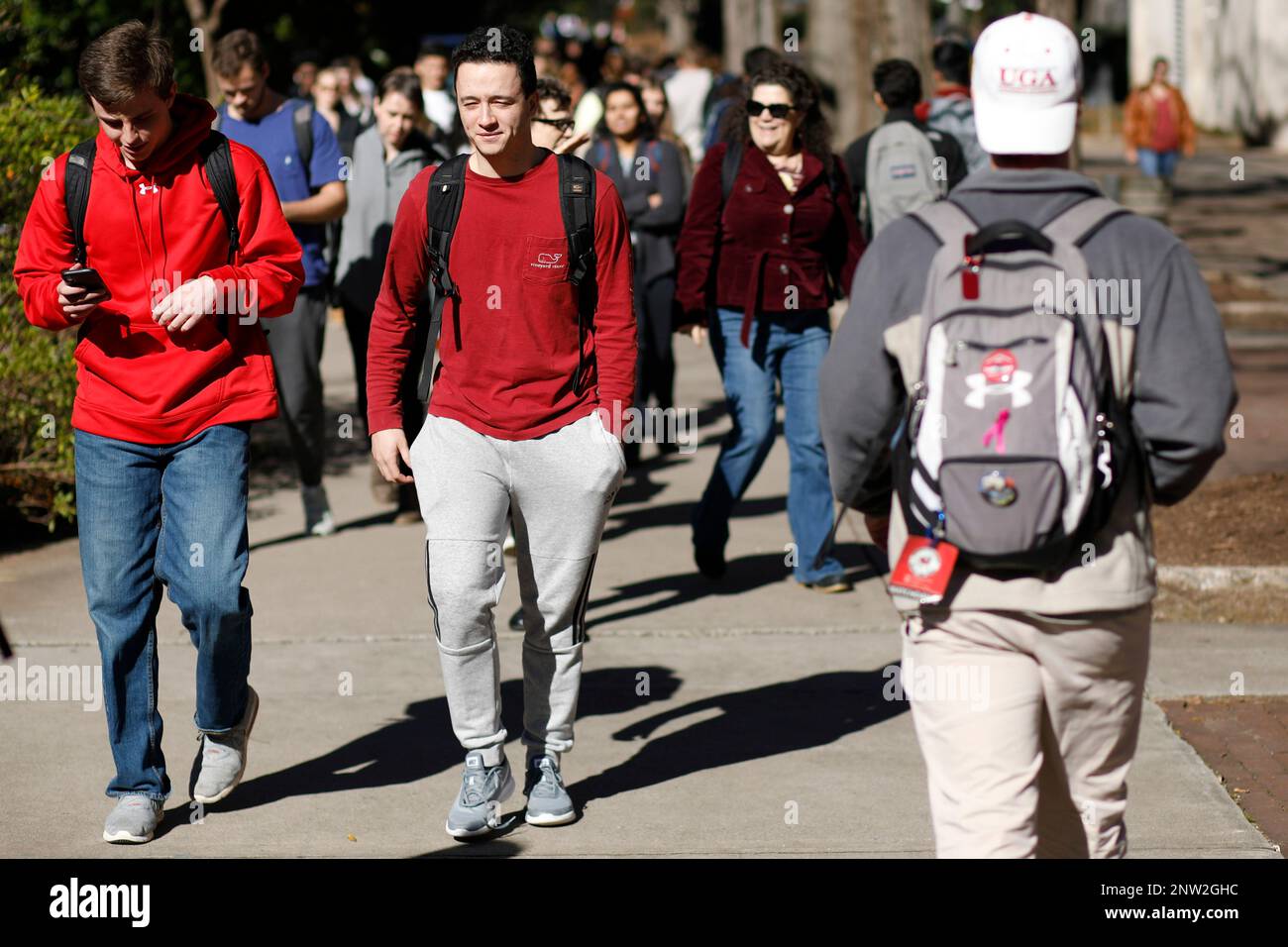 University of Georgia students head to class on the first day of the ...