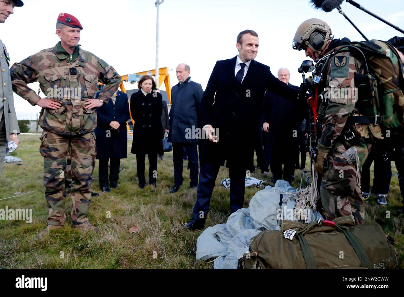 French President Emmanuel Macron, second right, meets paratroopers of ...