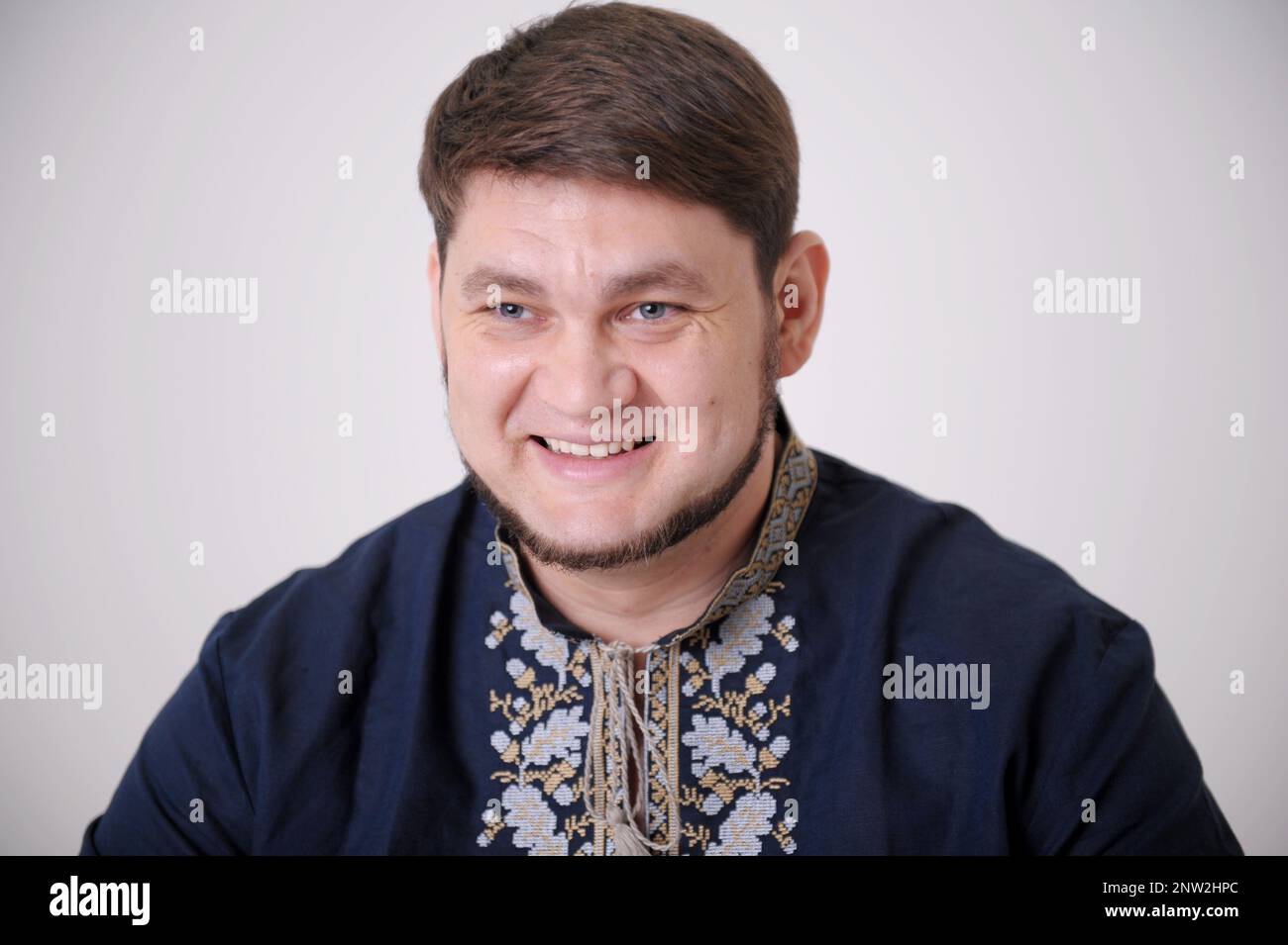 strong-willed face in national costume of Ukraine with Patriot smiling ...