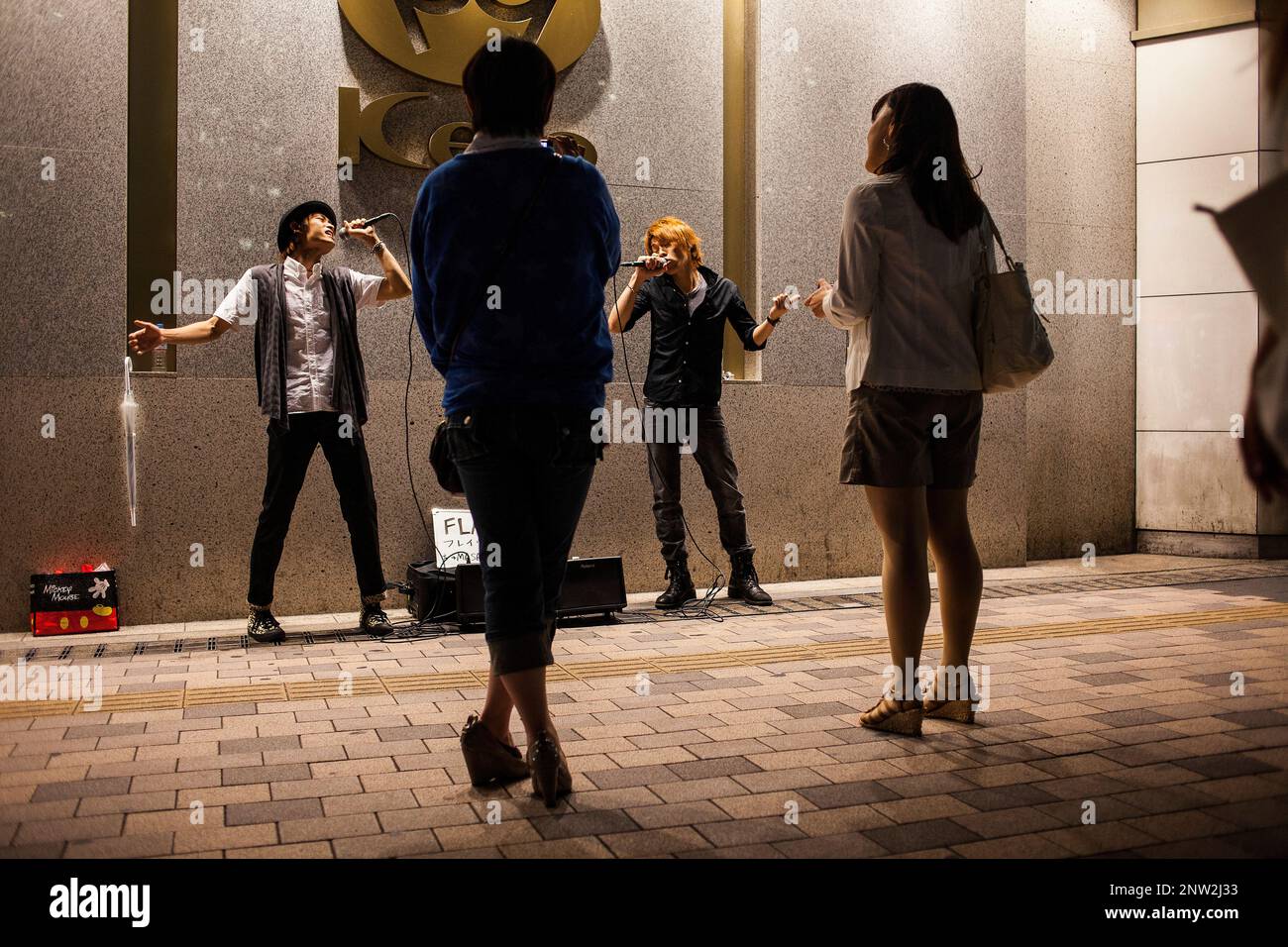 Street musicians, next to Shinjuku station, Shinjuku, Tokyo City, Japan ...