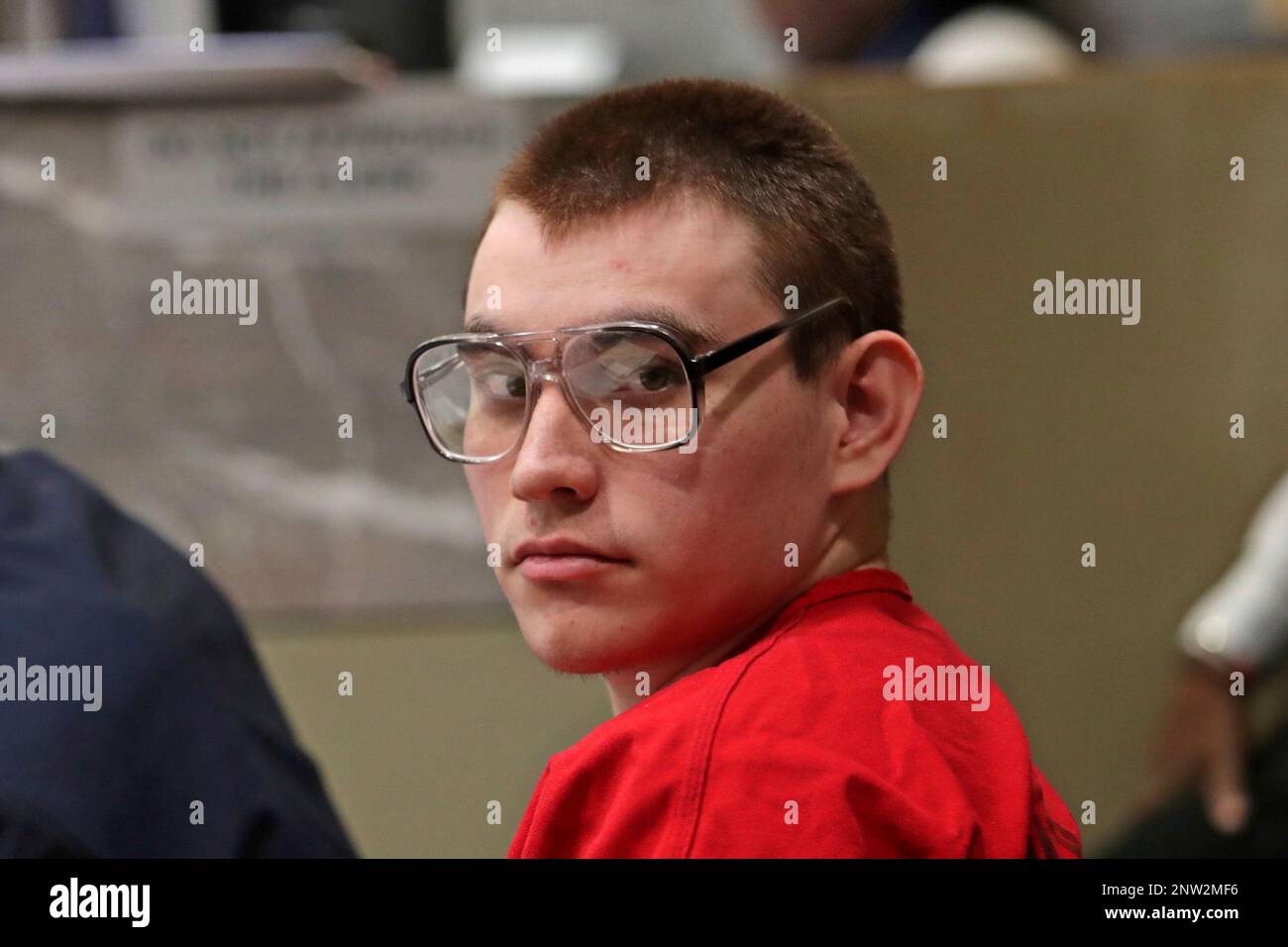 Parkland school shooting suspect Nikolas Cruz sits during a status ...