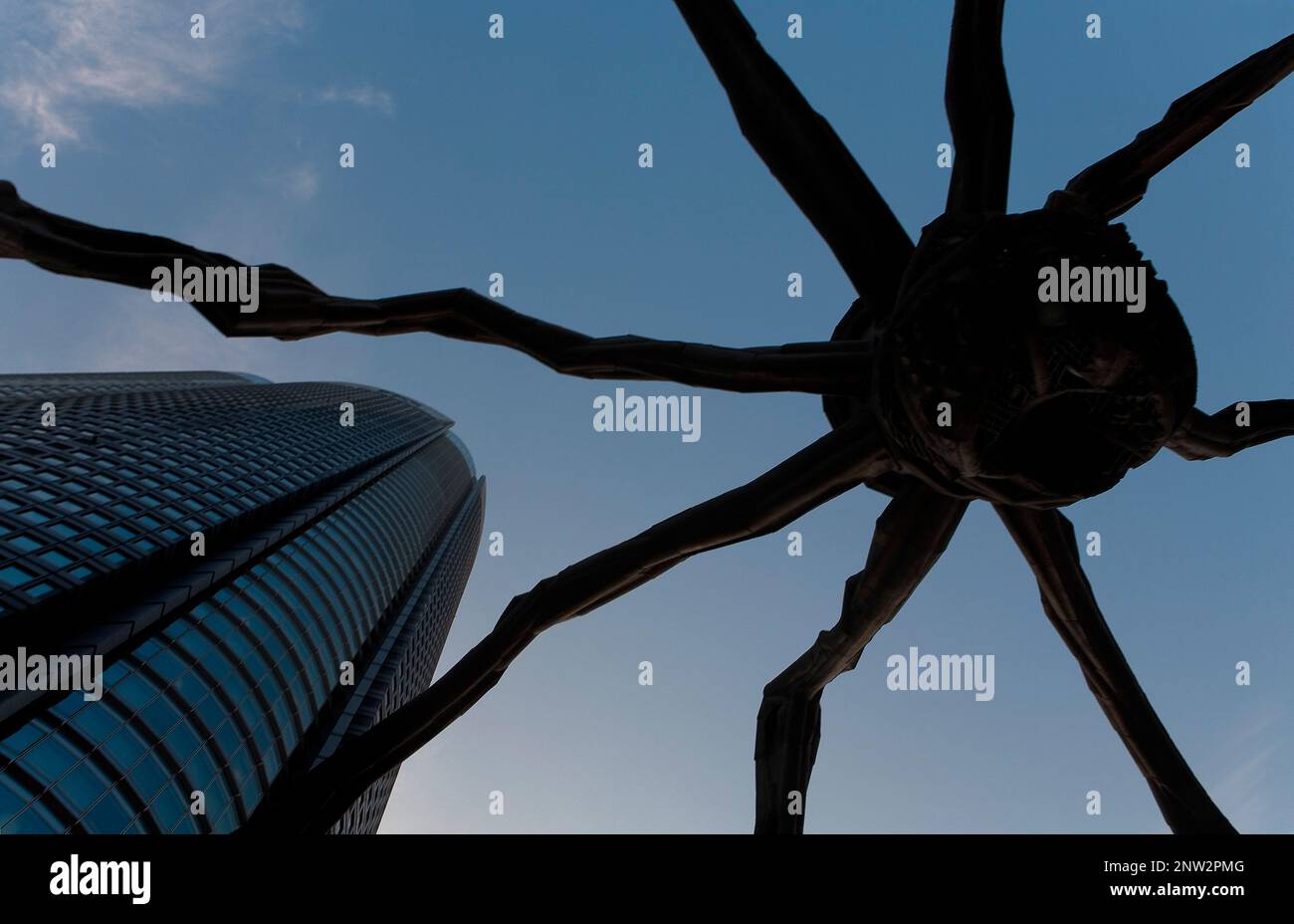 Roppongi Hills. Mori Tower and spider in Roku-Roku plaza.Tokyo city ...