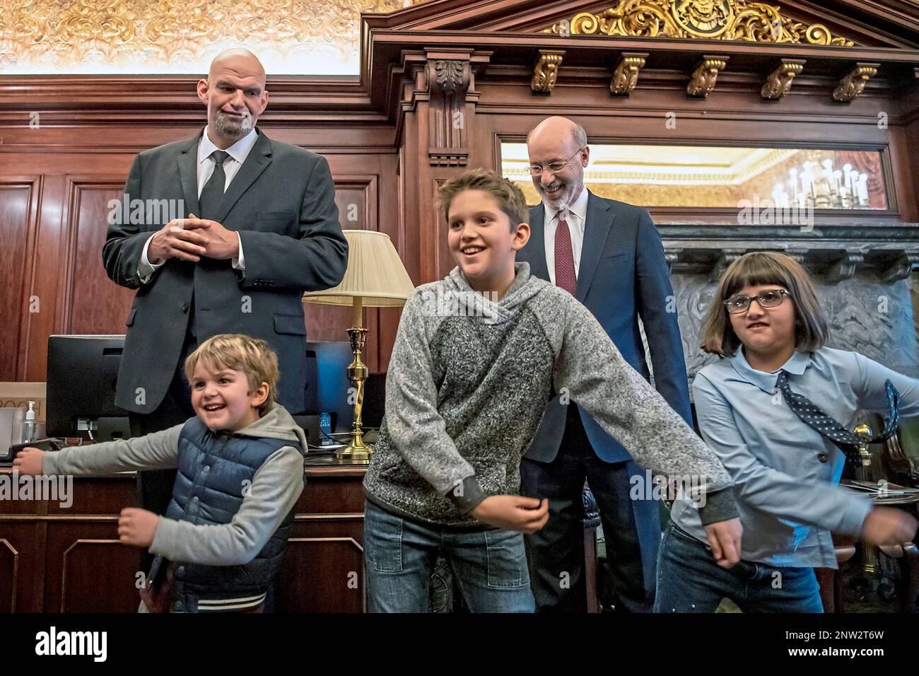 Lt. Gov.-elect John Fetterman and Gov. Tom Wolf look on as Fetterman's ...