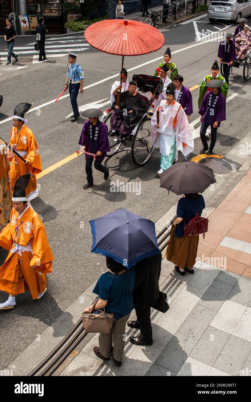Parade near Ichigaya station,during Sanno Matsuri.The parade begins and ...