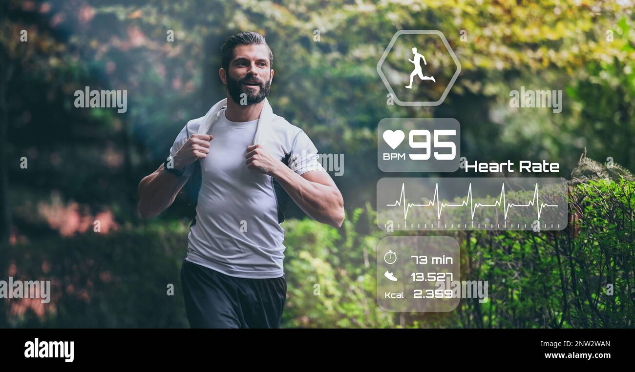 Man running in the park. Healthy runner with smart fit watch ...