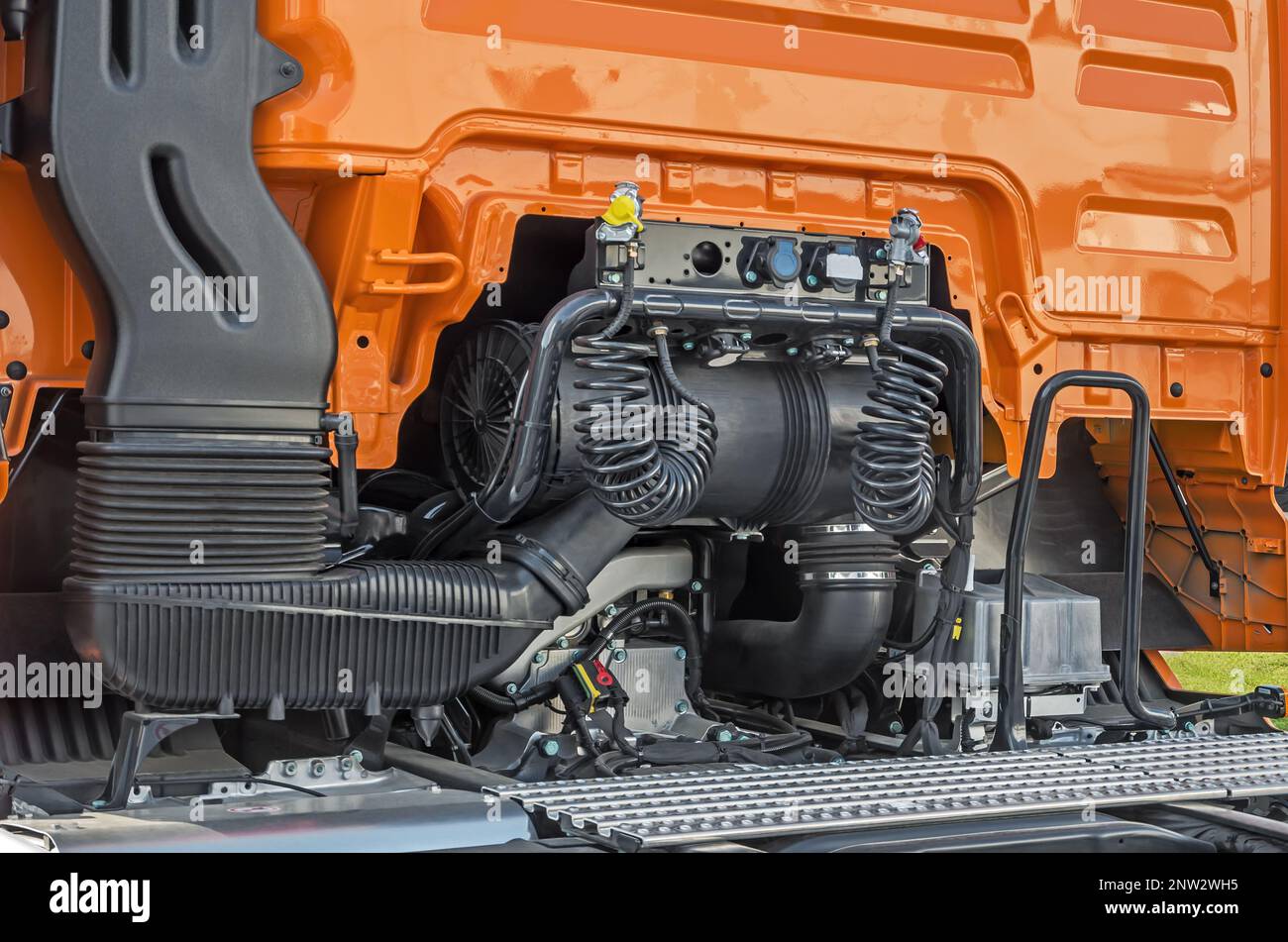 Rear side of cab high-tonnage truck. View of the engine, gearbox ...