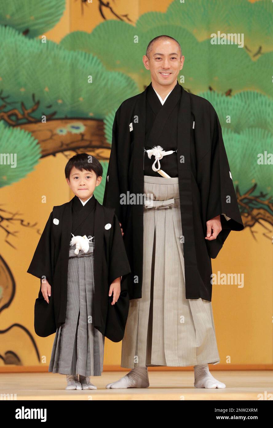Ichikawa Ebizo (R), together with his 5-year-old son Kangen Horikoshi ...