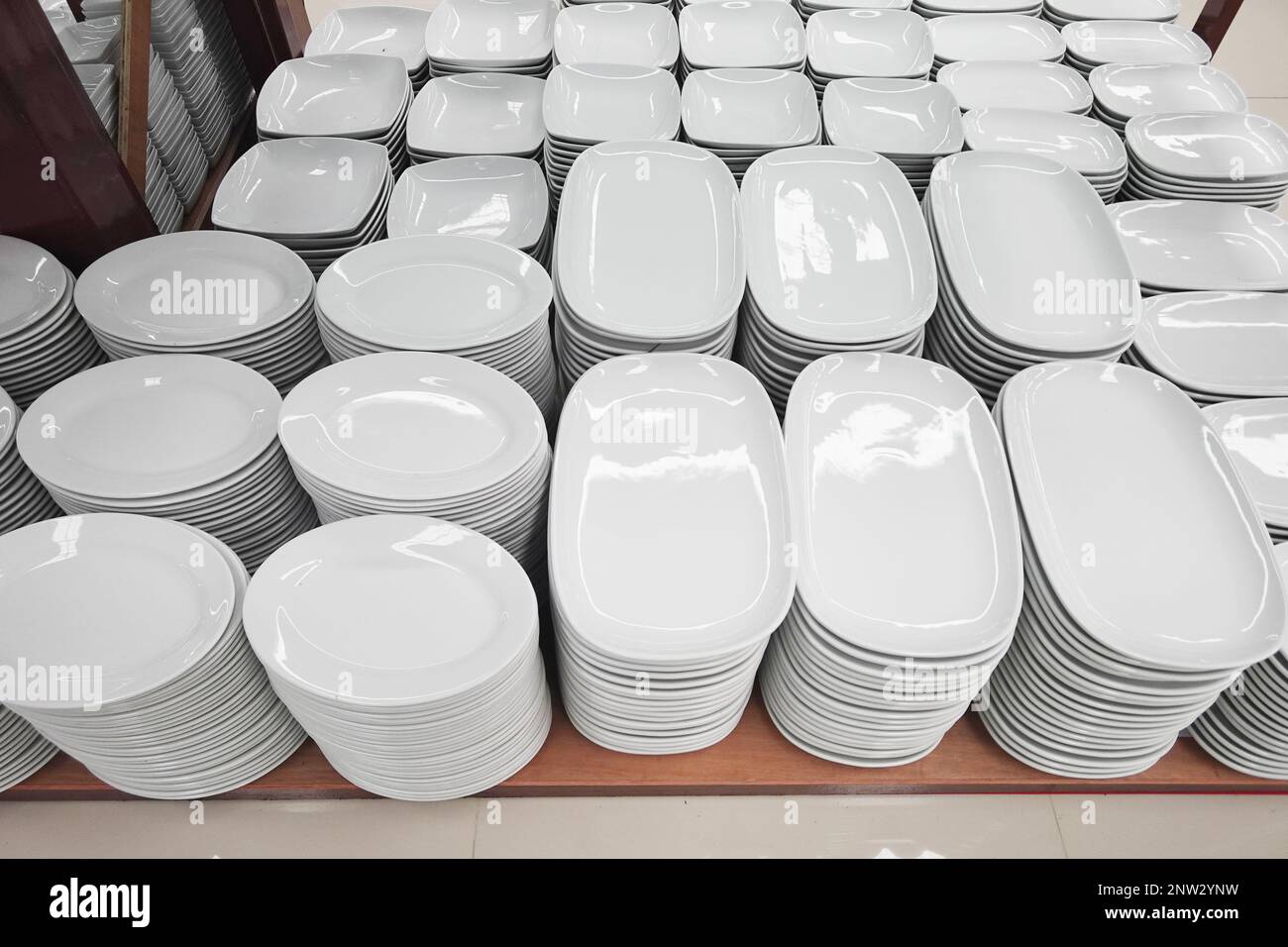Stacks of plates in a shop Stock Photo - Alamy