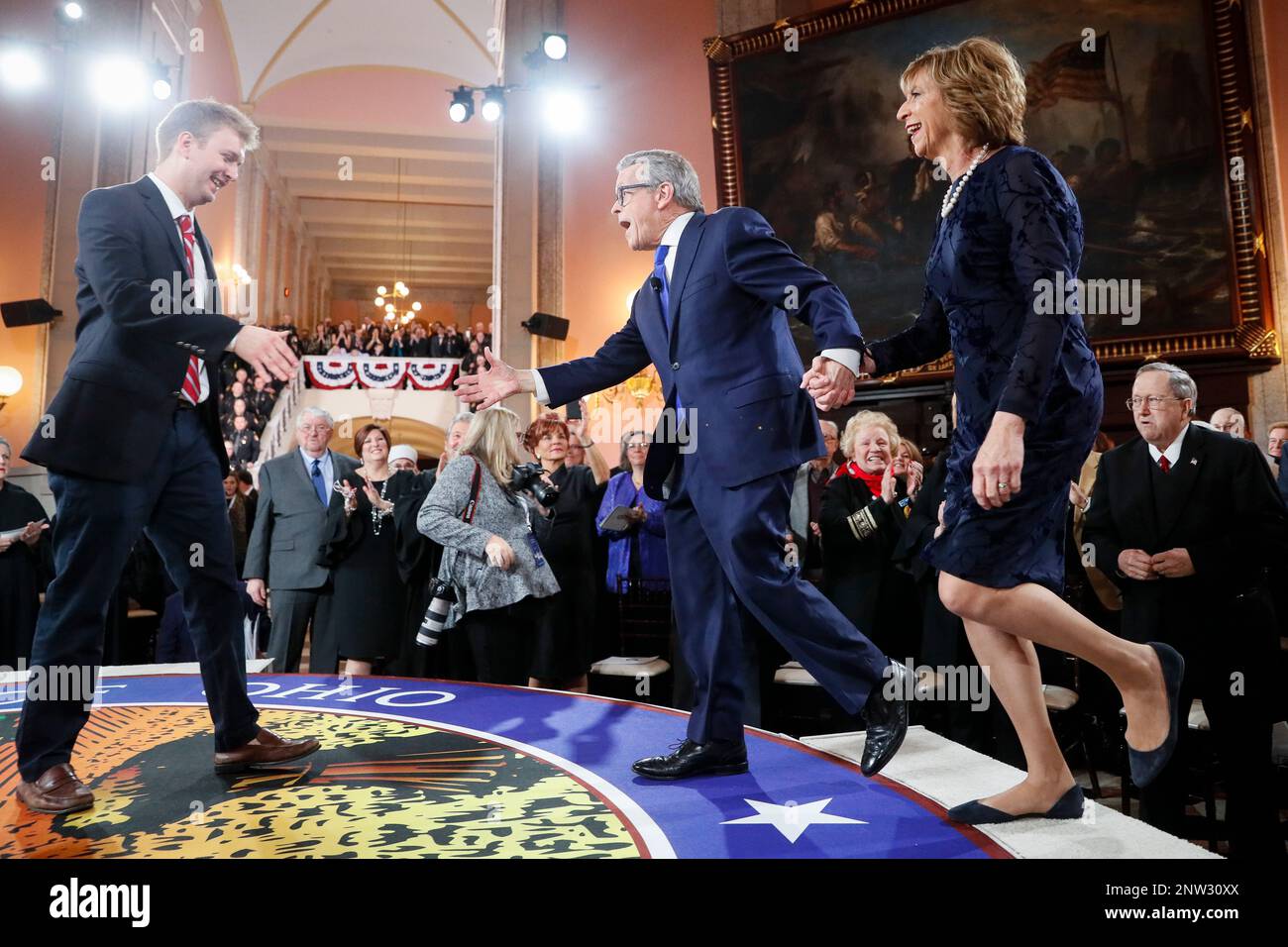 Ohio Governor Mike DeWine, center, and his wife Fran, right, take the ...