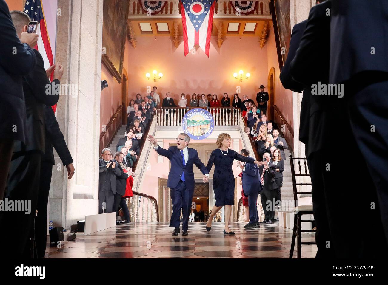 Ohio Governor Mike DeWine, center left, and his wife Fran walk into the ...