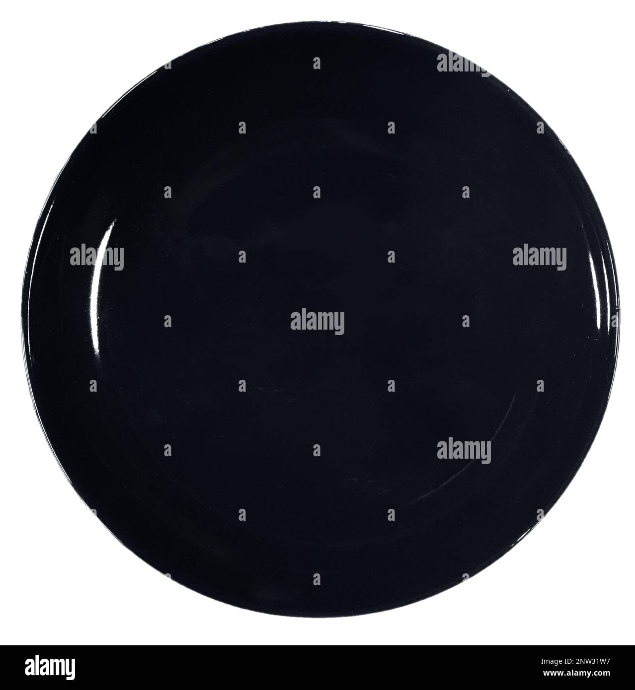 Empty black plate isolated on white background Stock Photo - Alamy