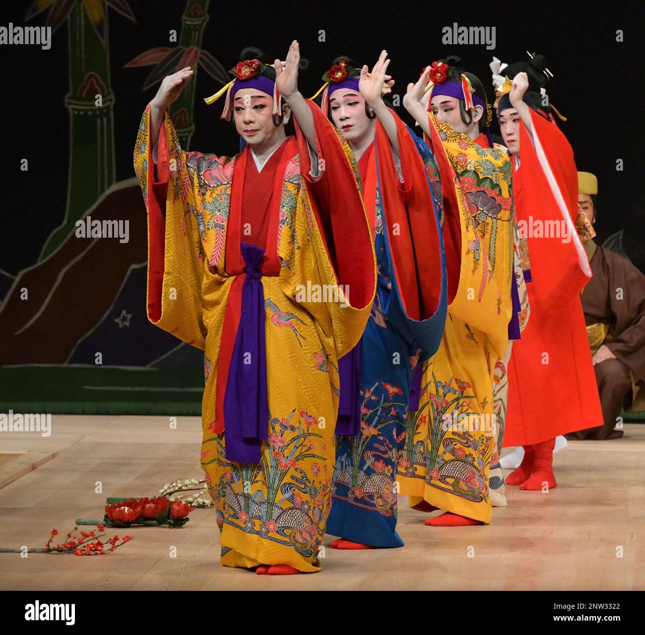 Ryukyu Dancer Yukichi Agarie (front) performs during the Kumiodori ...