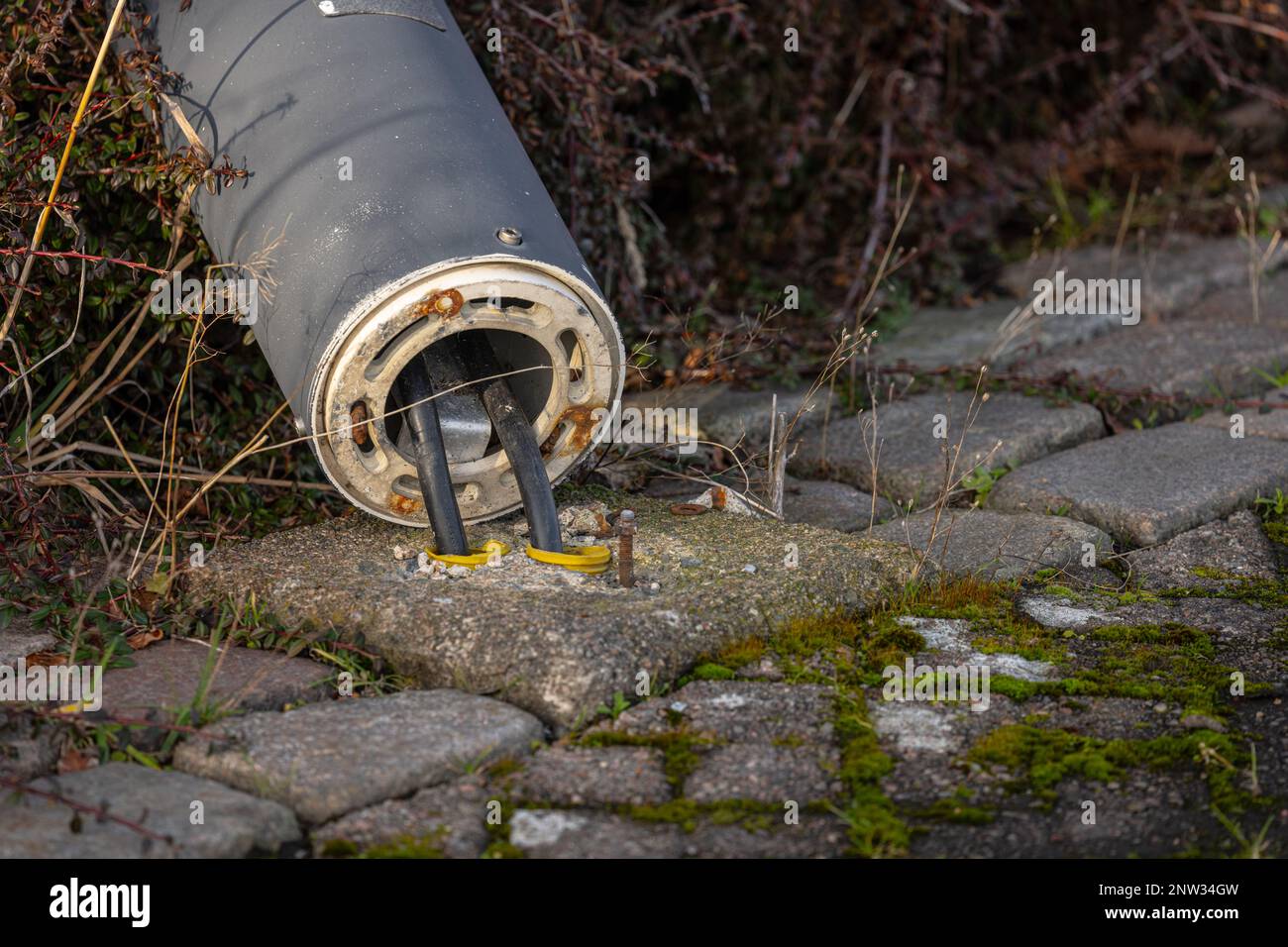 Base of a broken outdoor lamp post Stock Photo - Alamy